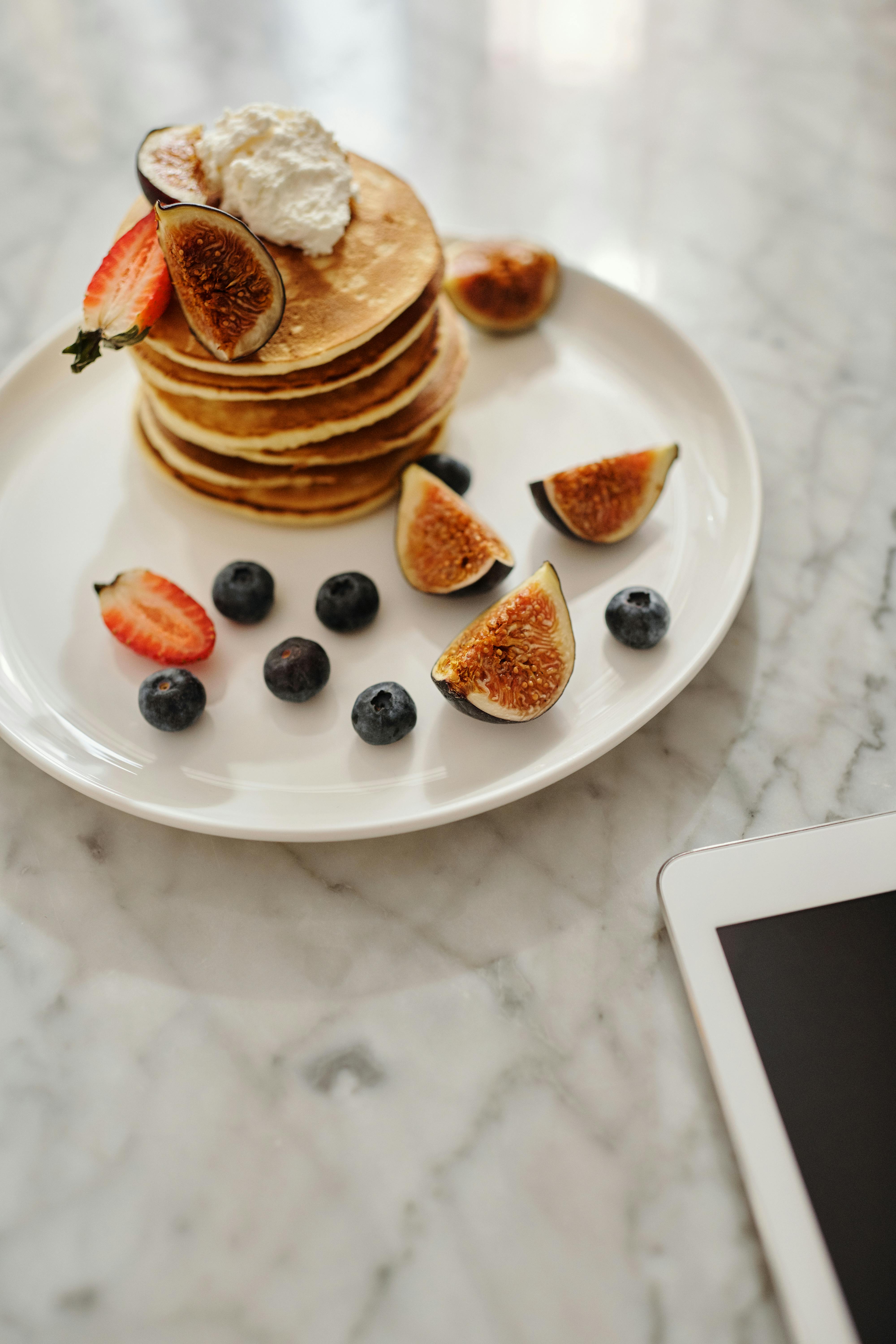 Pancakes With Berries on White Ceramic Plate · Free Stock Photo