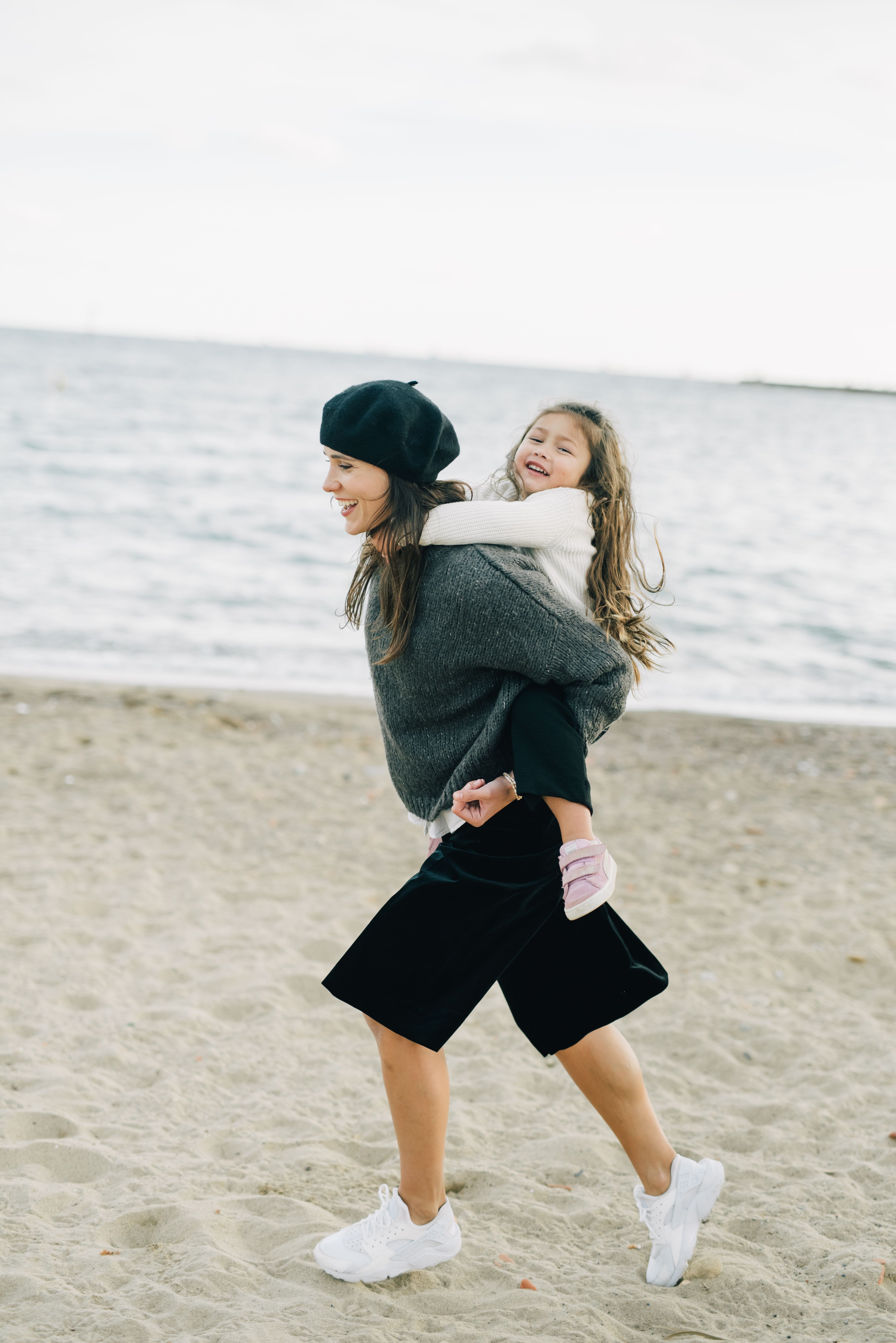 A Girl Piggyback Riding a Woman · Free Stock Photo