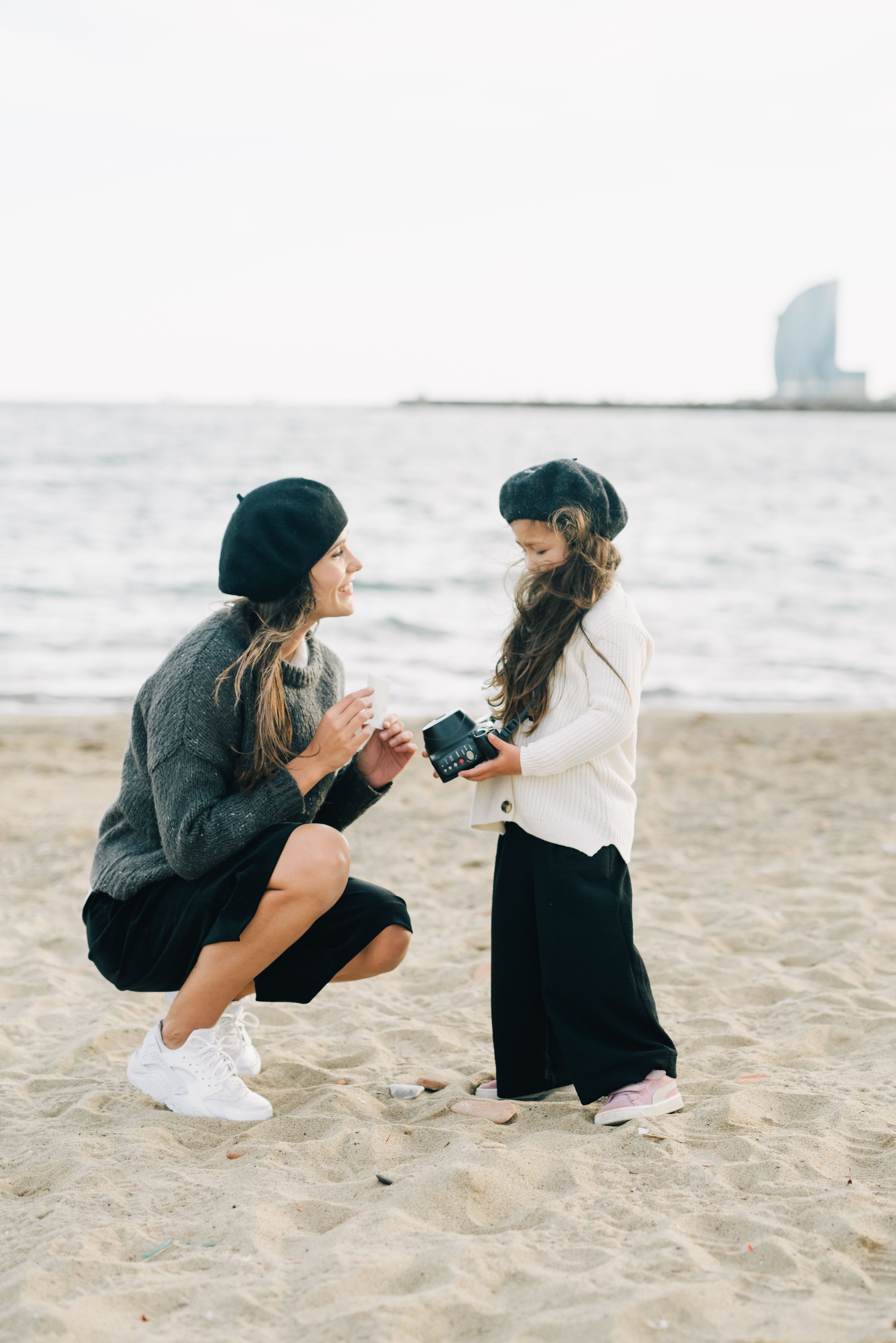 Mother looking at her Child Happily · Free Stock Photo