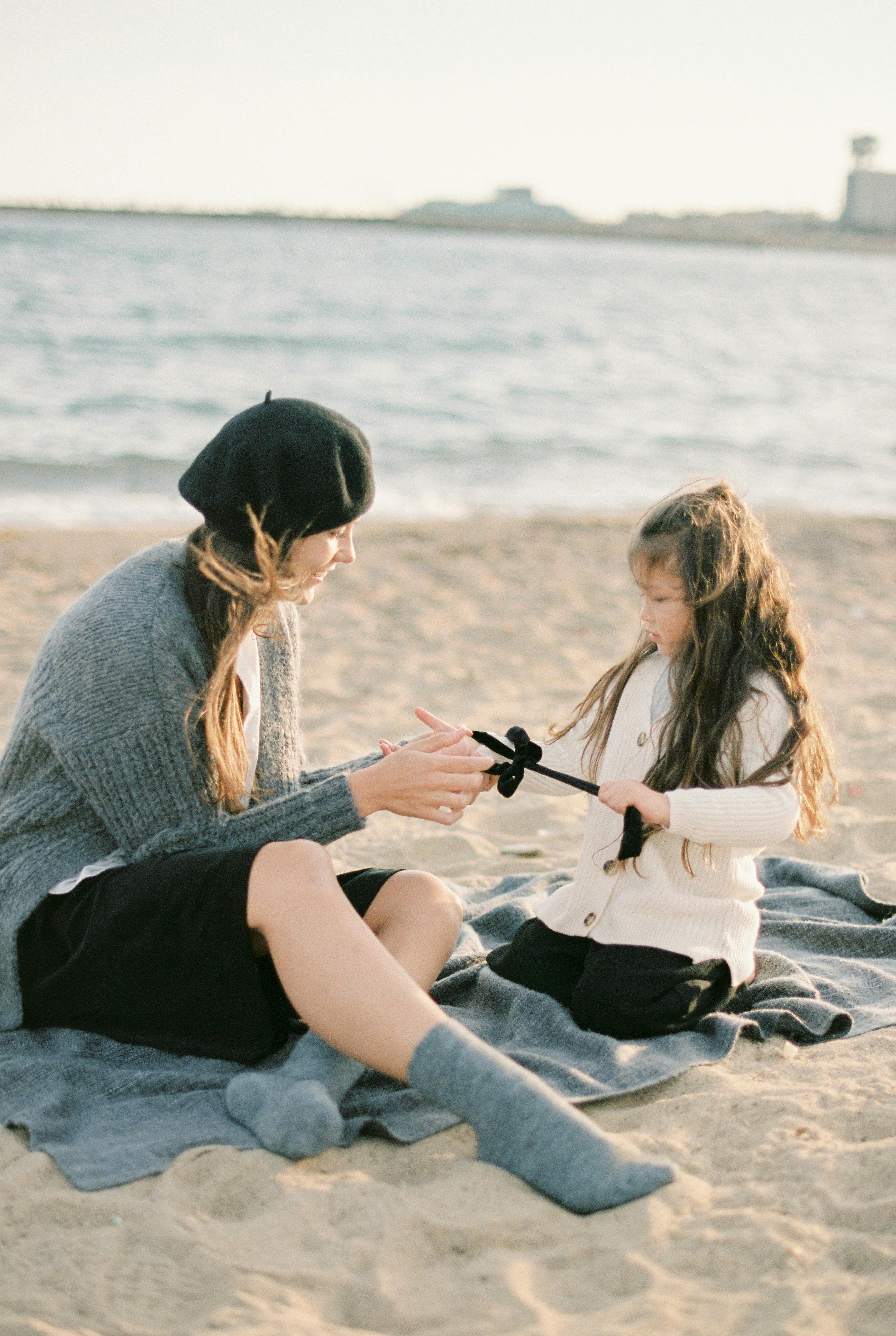 Woman and Child Running on Beach Sand · Free Stock Photo
