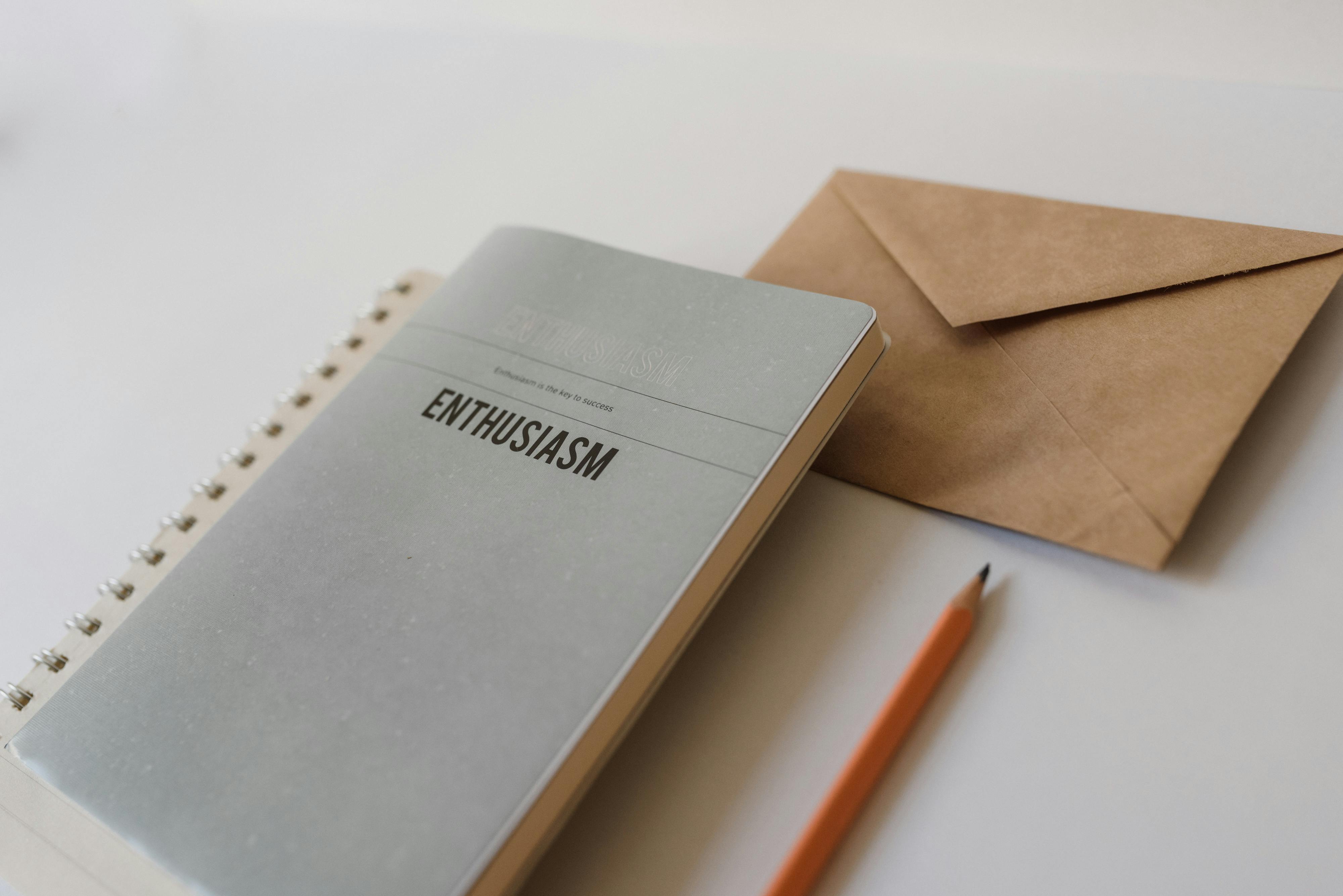 Notepad, Envelope and Pencil · Free Stock Photo