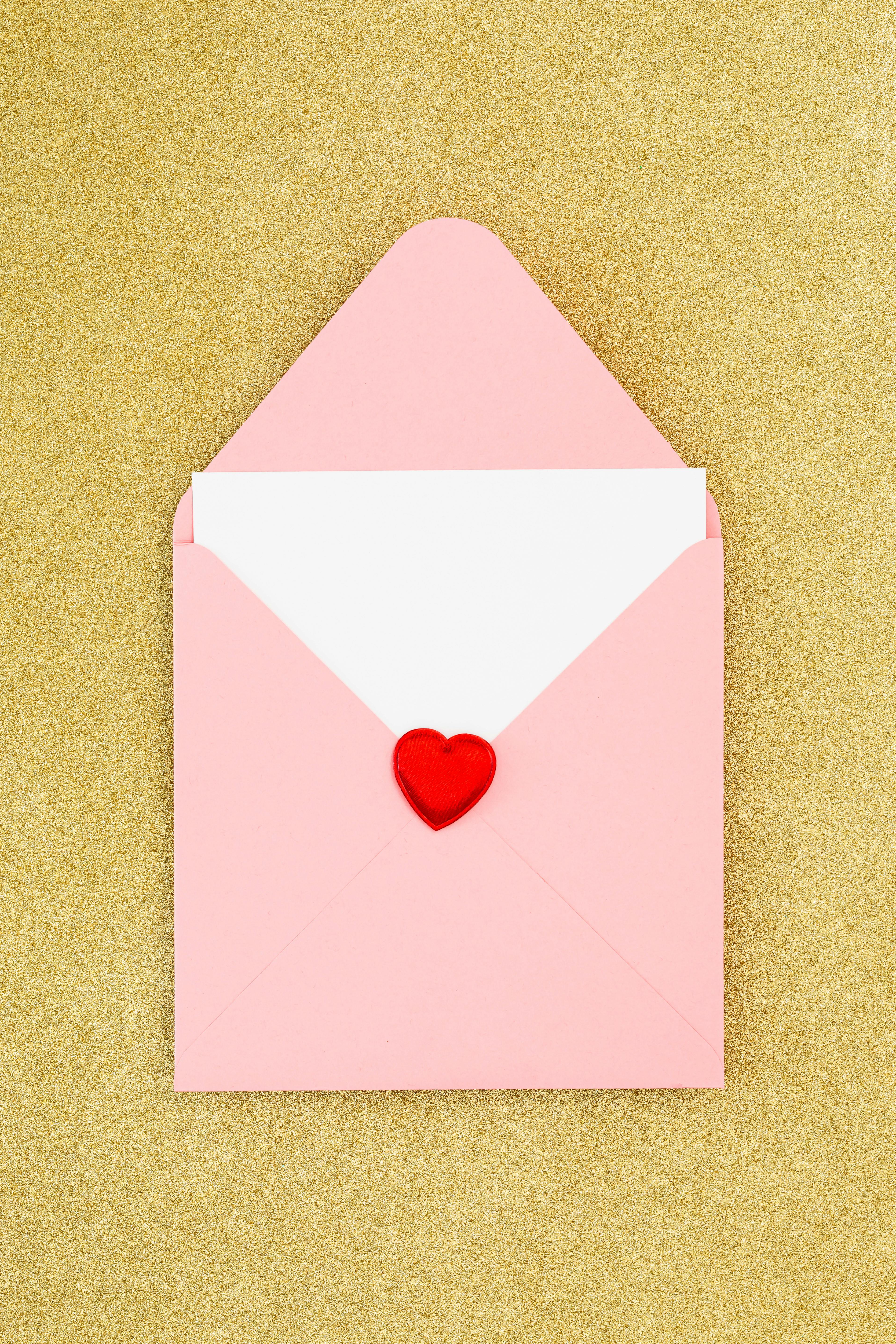 Valentine's Day Gift Box and Pink Envelope · Free Stock Photo