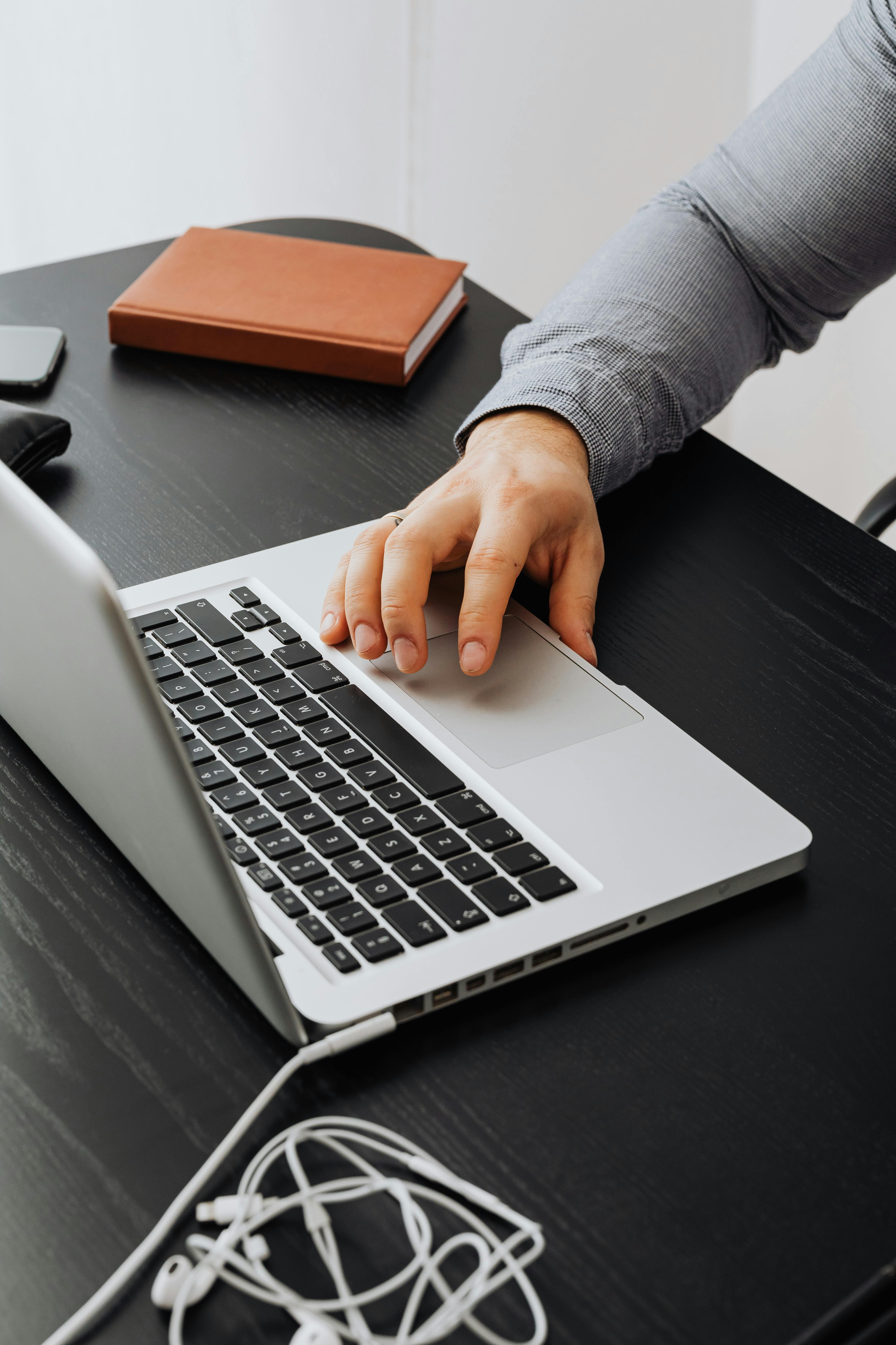 A Person Typing on the Laptop · Free Stock Photo