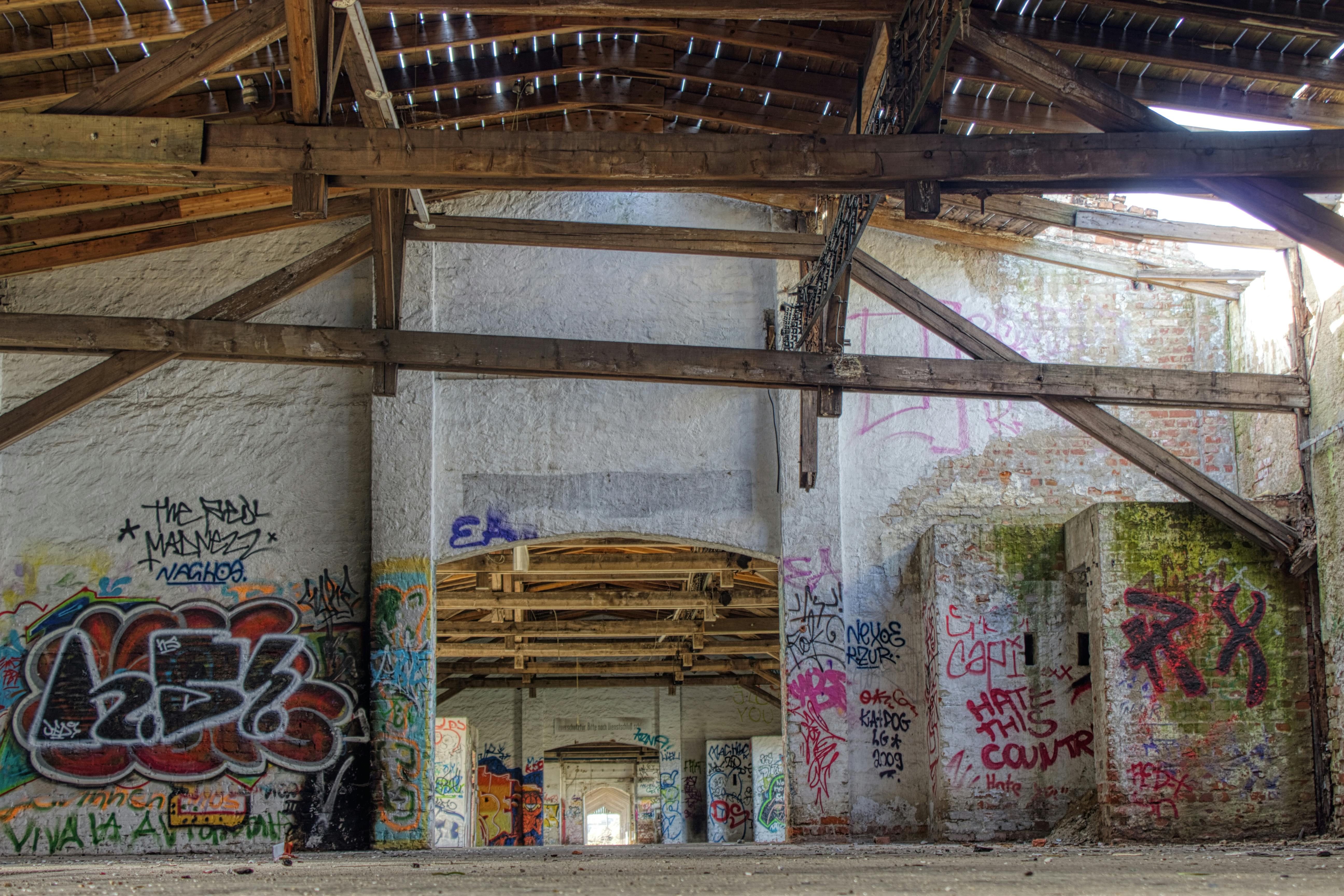 Graffiti Painted on Wall in Abandoned Building · Free Stock Photo