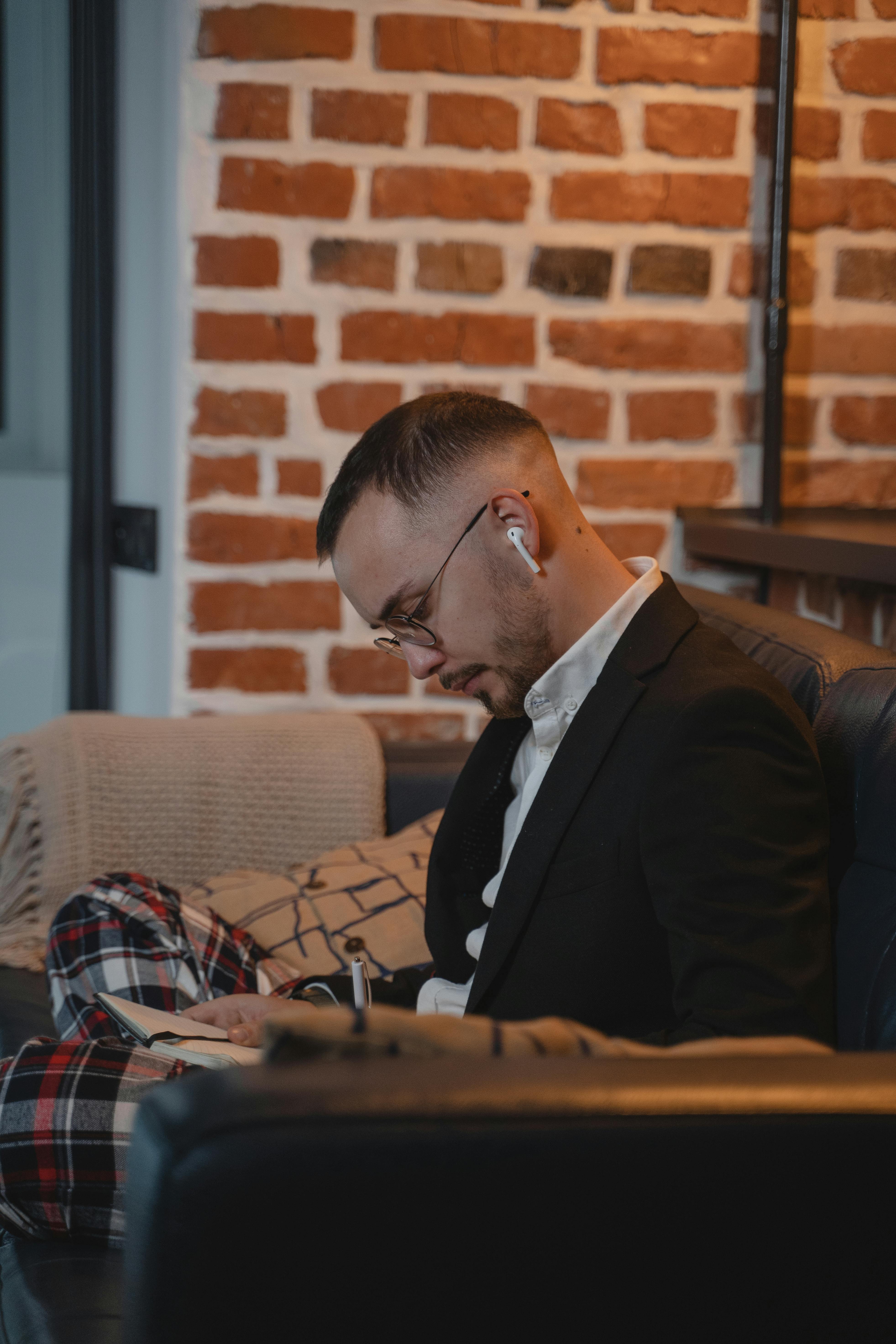 Man in Black Suit Jacket Using Laptop Computer · Free Stock Photo