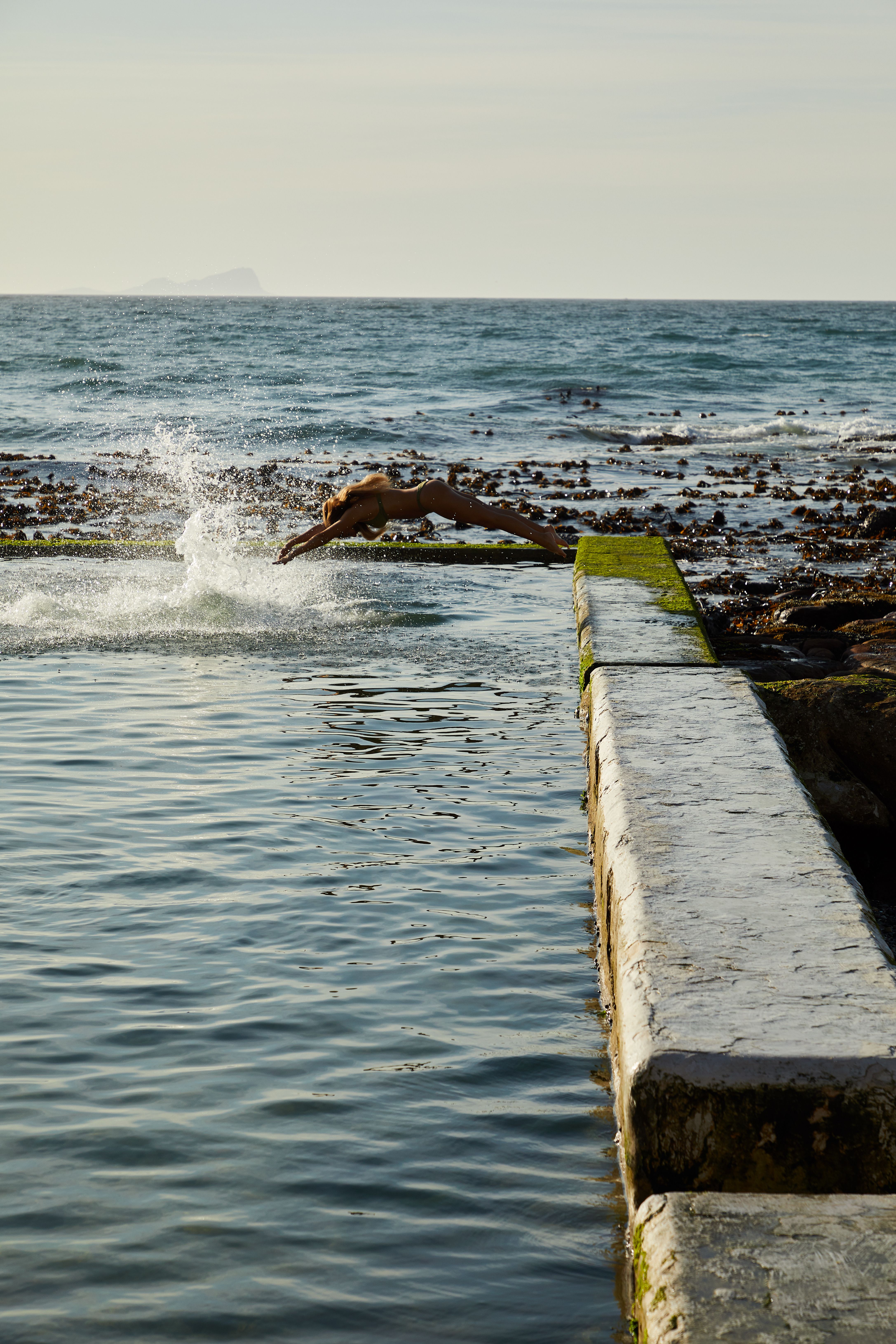 Woman Diving on the Tidal Pool · Free Stock Photo