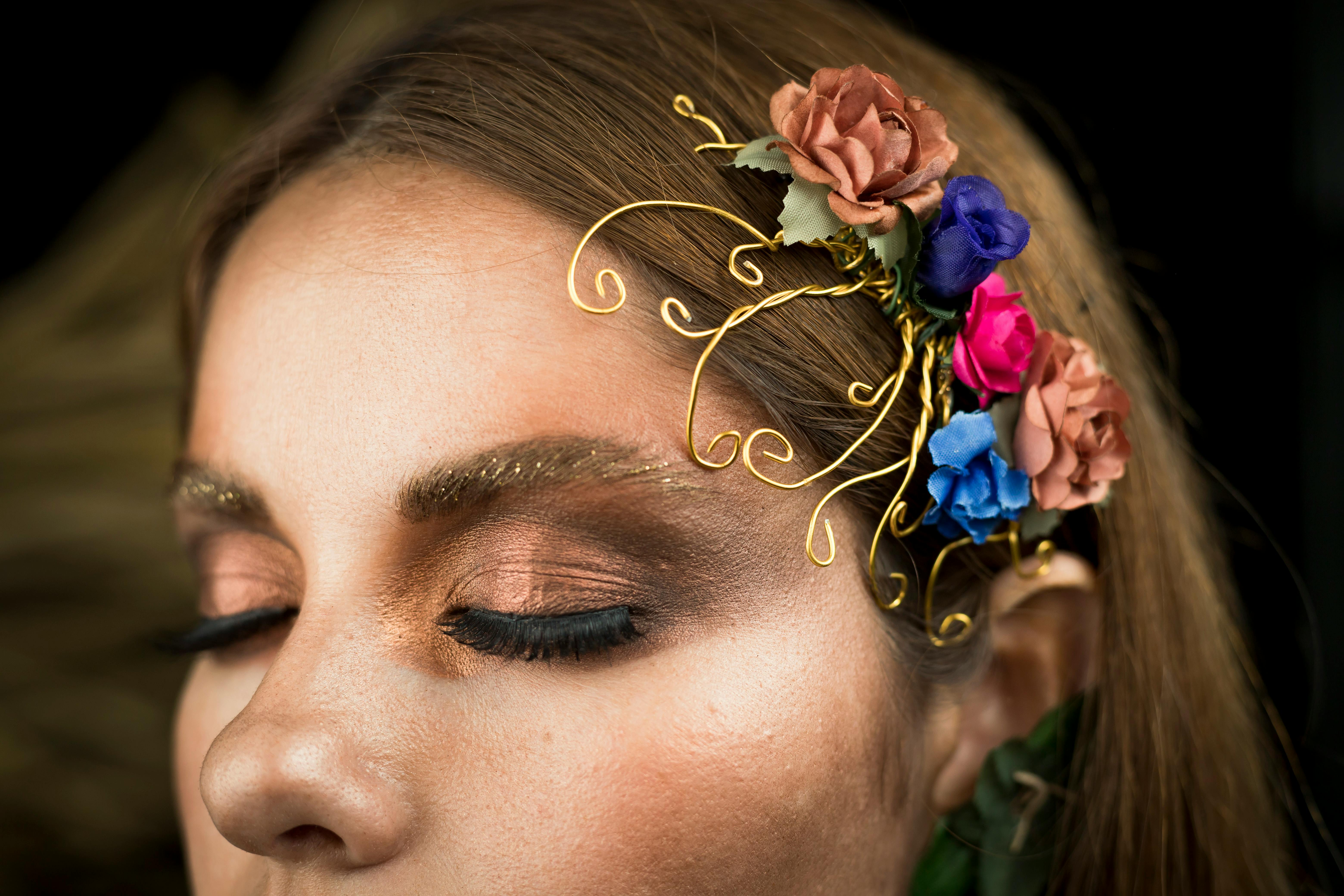 Woman With Flowers on Her Ear · Free Stock Photo