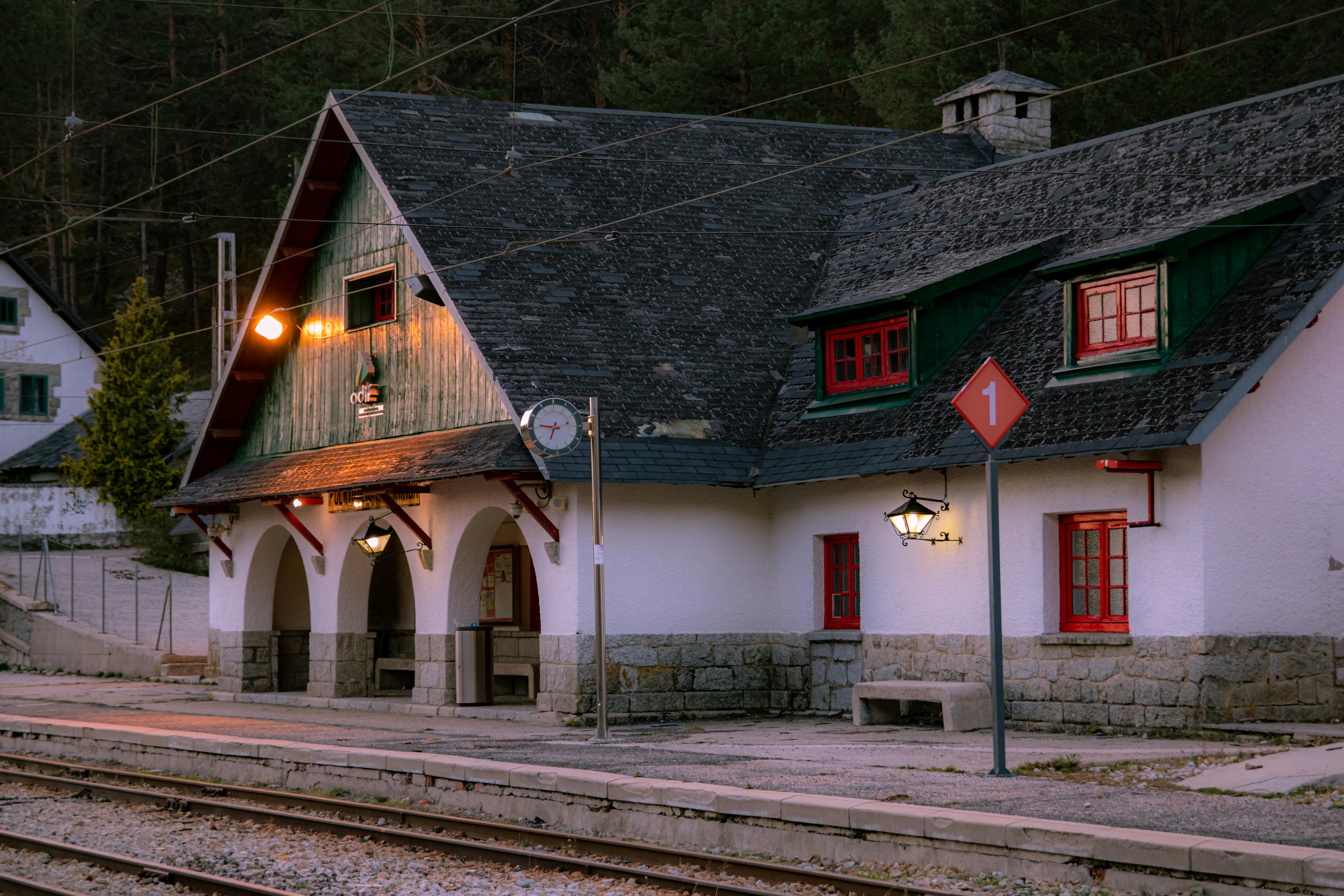 Train Station Building with Concrete Platform Beside the Track · Free ...