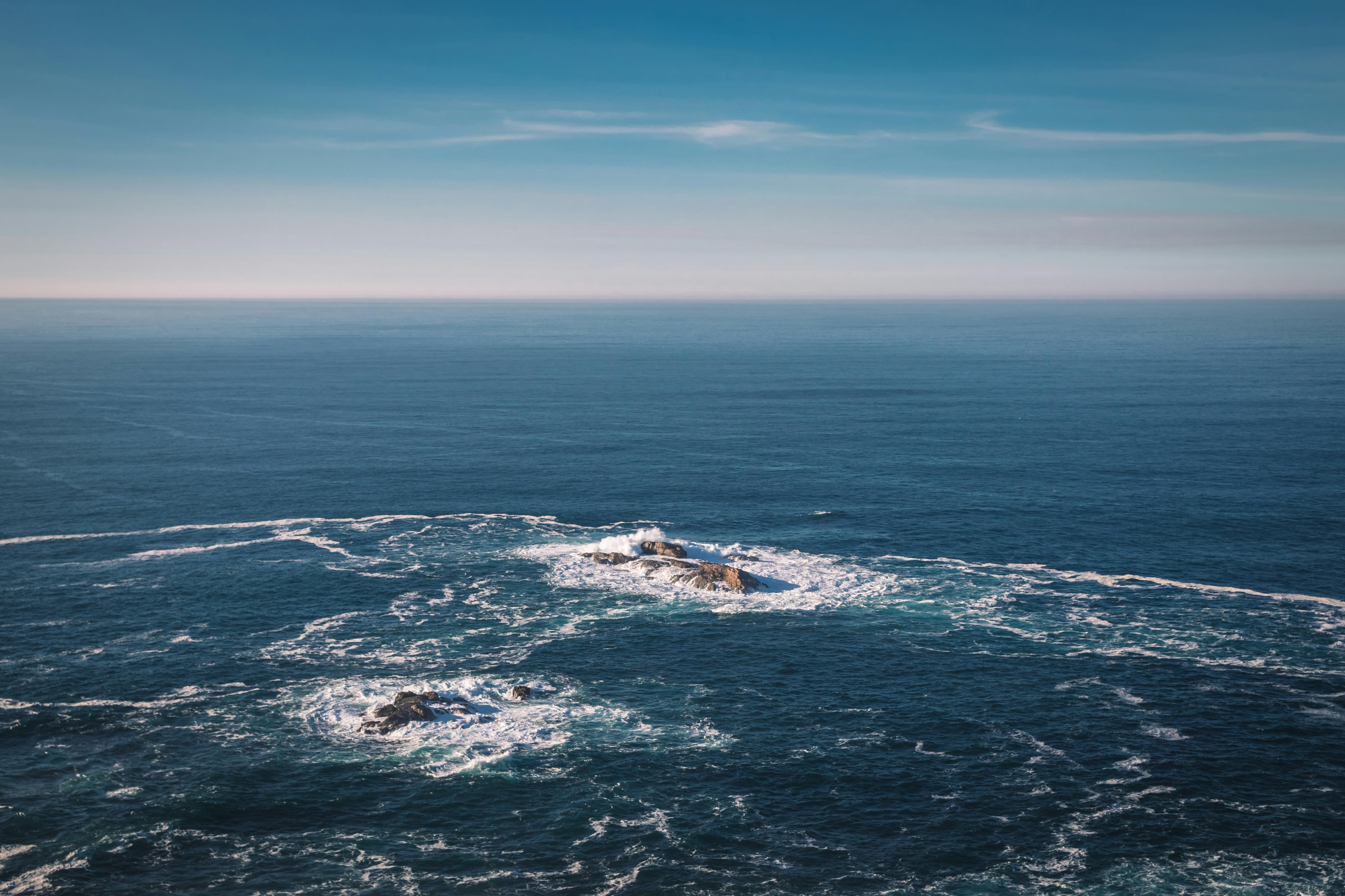 Blue Ocean Under the Blue Sky · Free Stock Photo