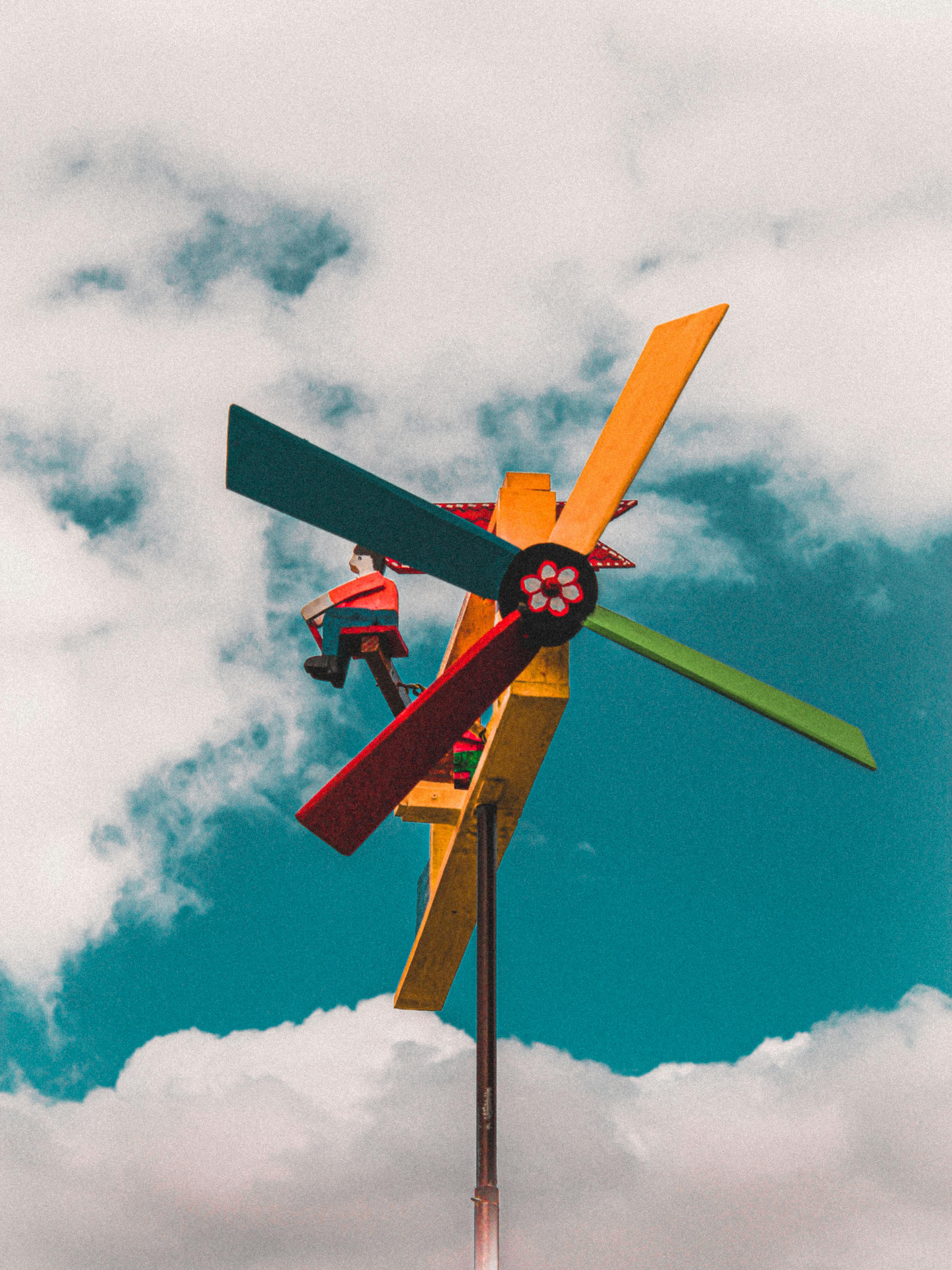 Multi Color Lighthouse Under the Blue Sky · Free Stock Photo