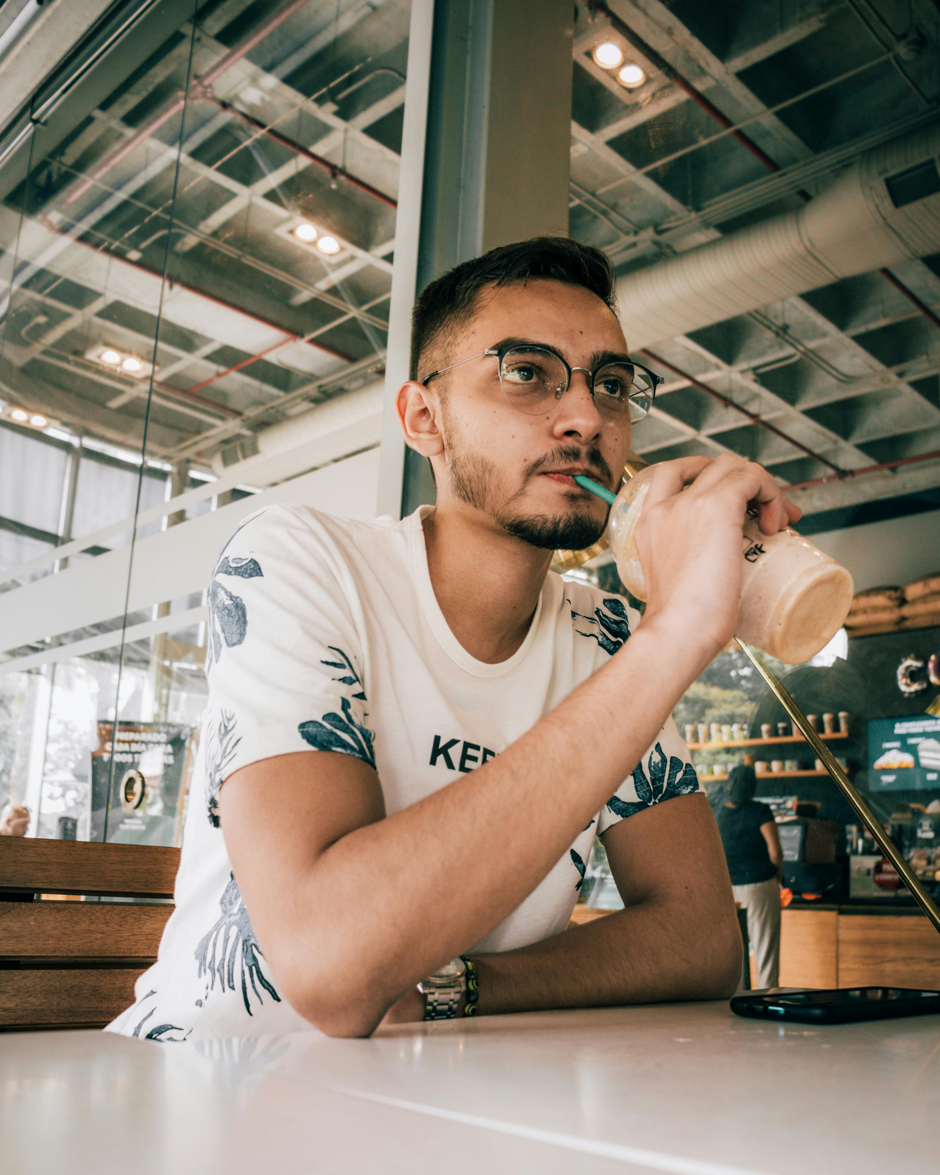 A Man Sitting at the Table · Free Stock Photo