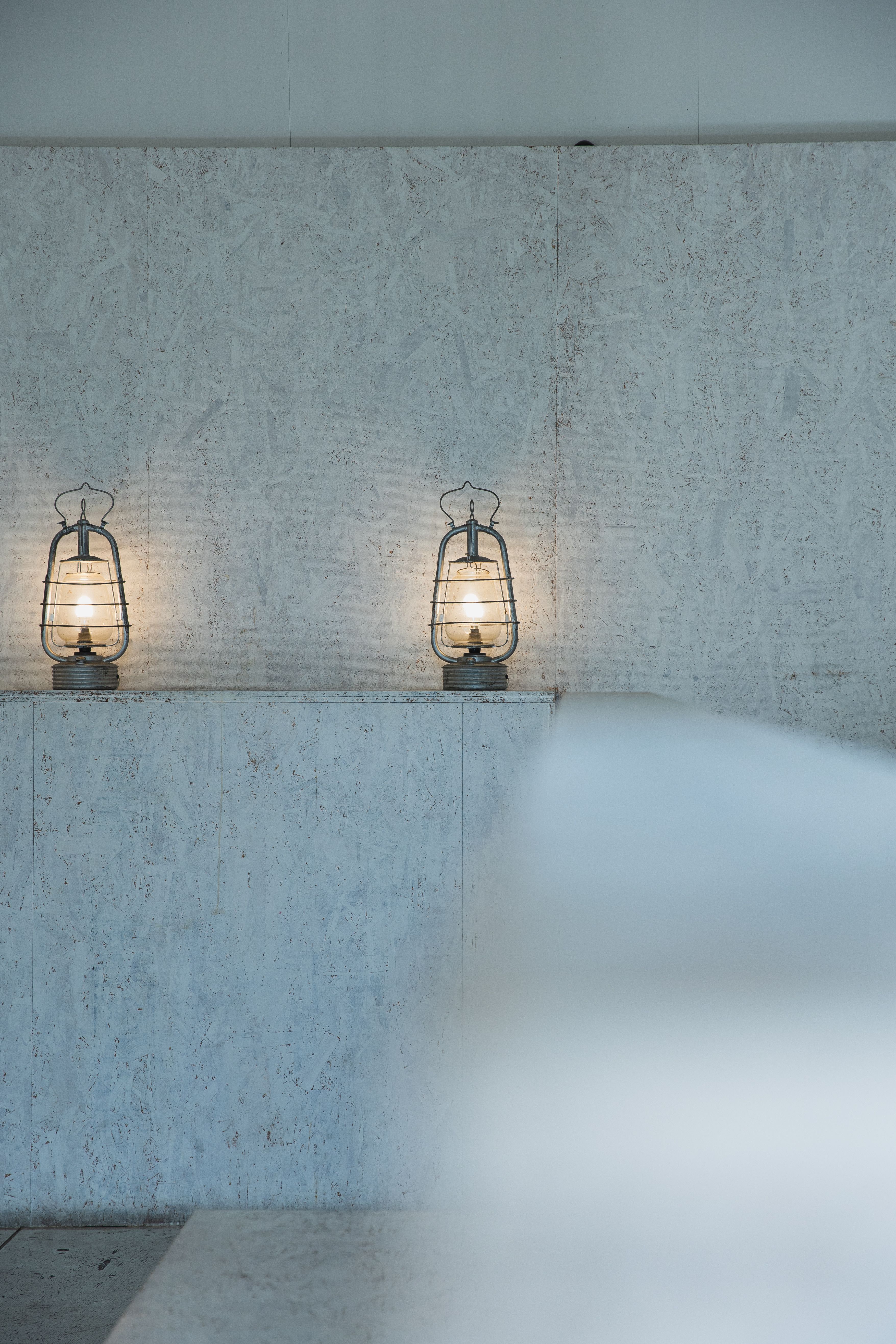 Spacious room with flashlights on shelf · Free Stock Photo