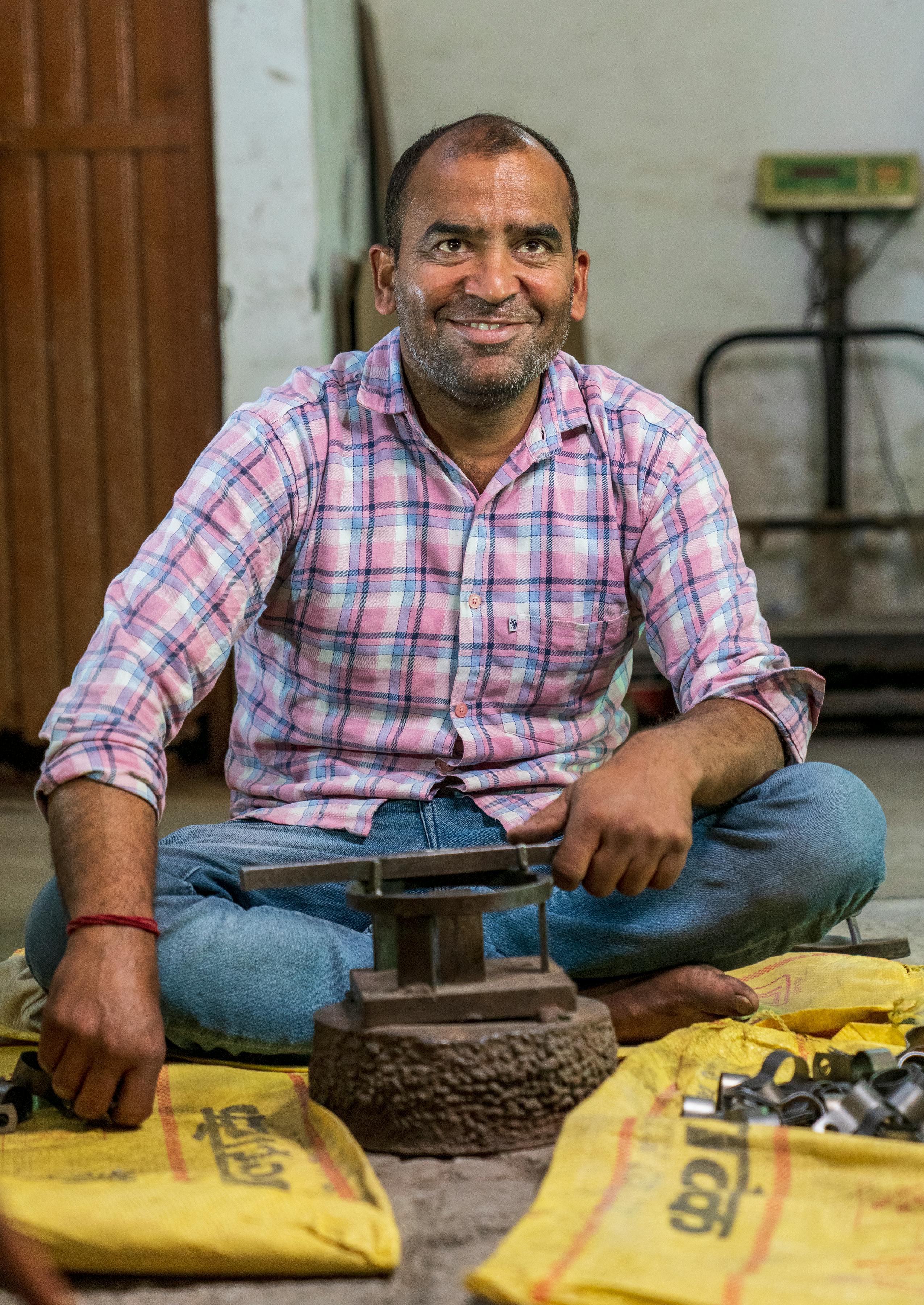 A Smiling Woman Holding a Colorful Round Object · Free Stock Photo
