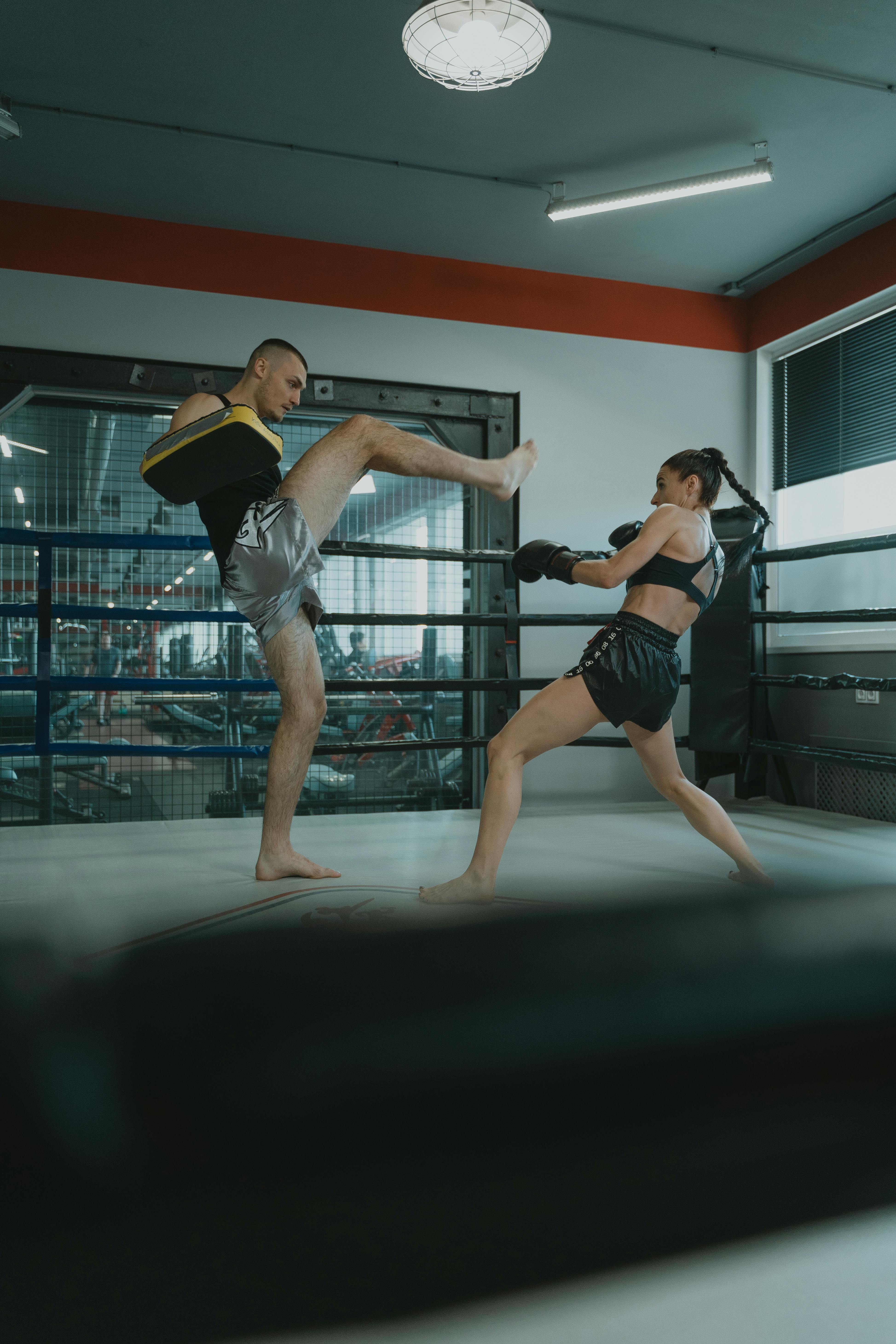 A Man and Woman Boxing · Free Stock Photo