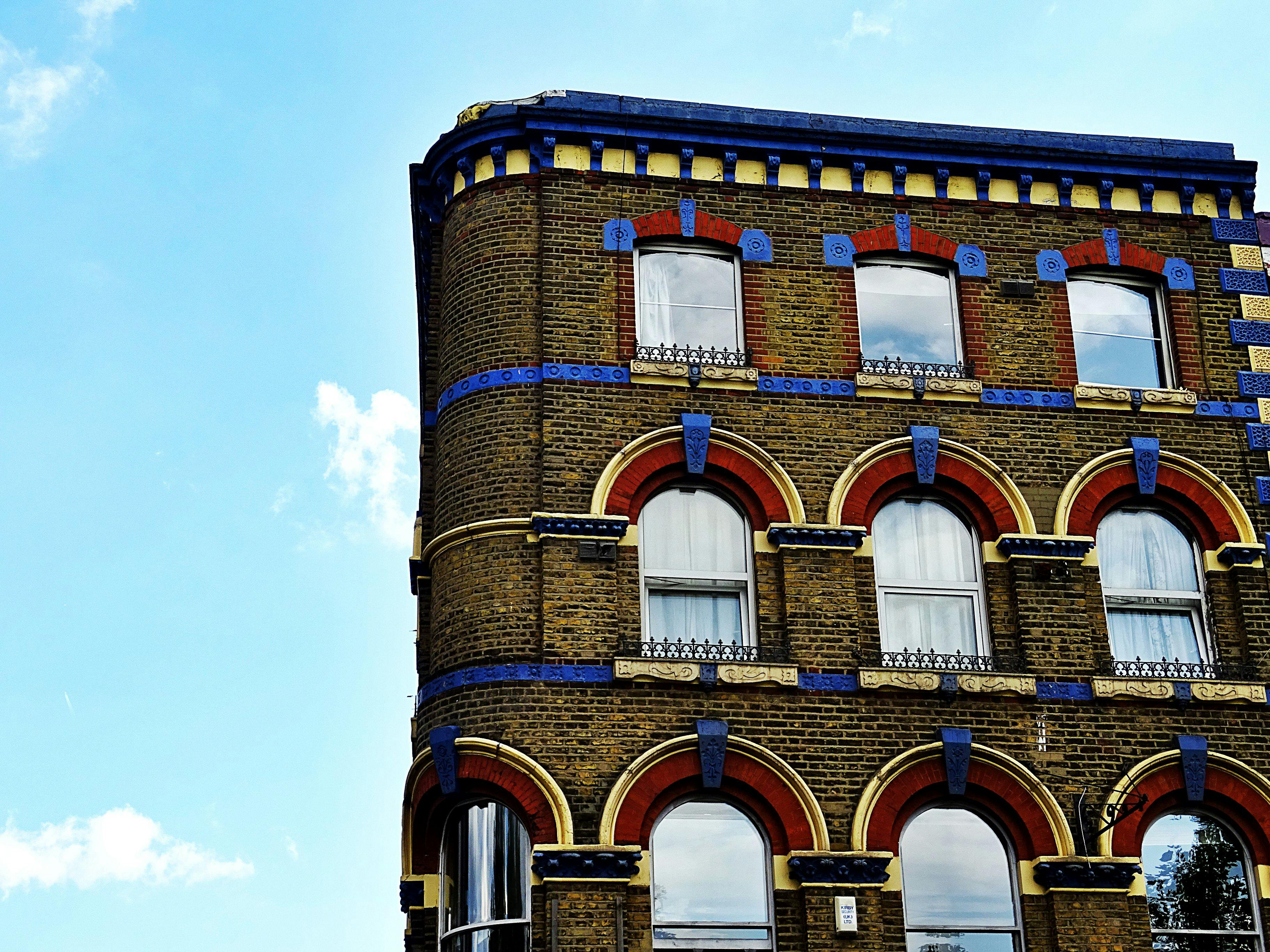 Brown and Blue Concrete Building · Free Stock Photo
