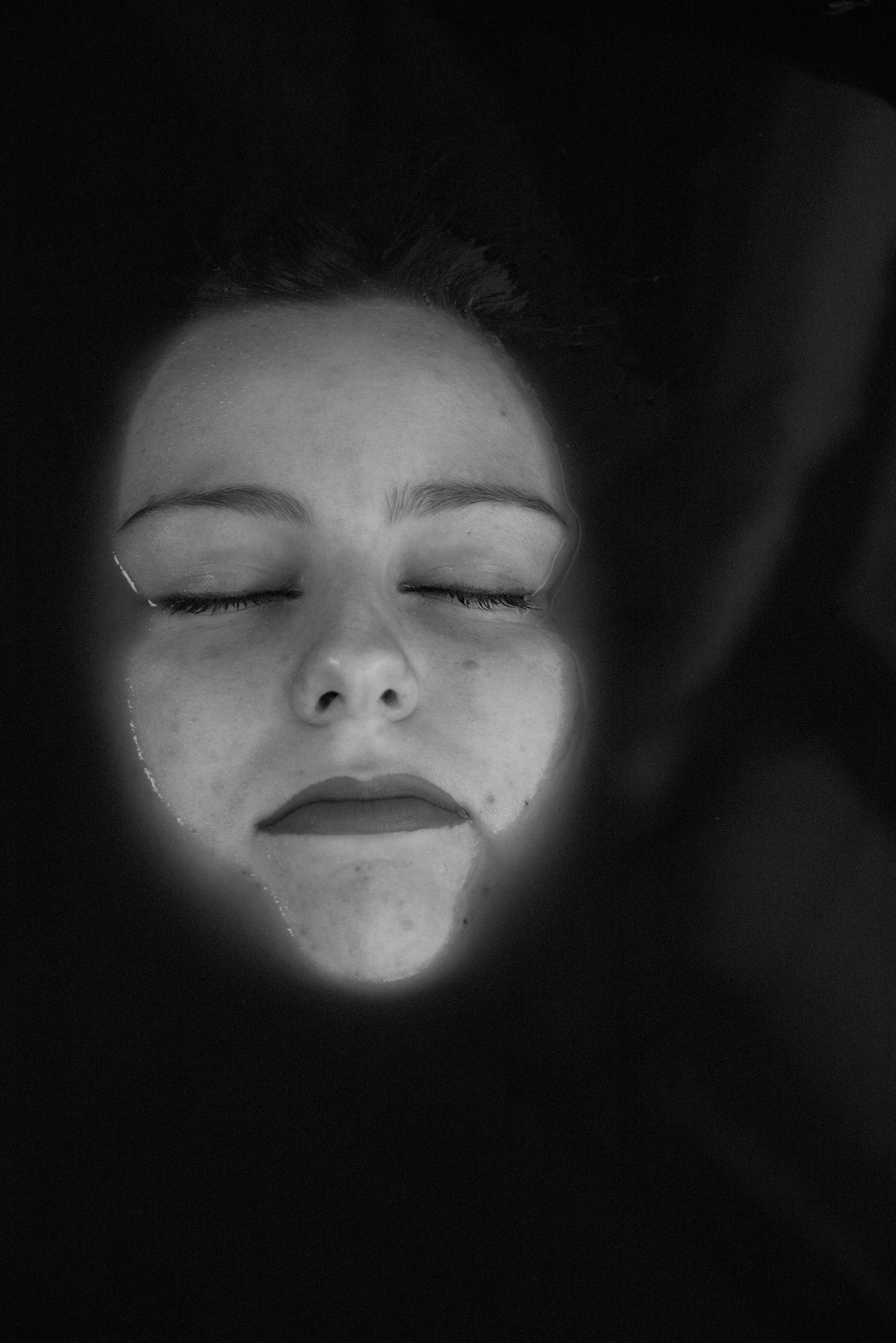 Grayscale Photo of Womans Face Dipped in Water · Free Stock Photo