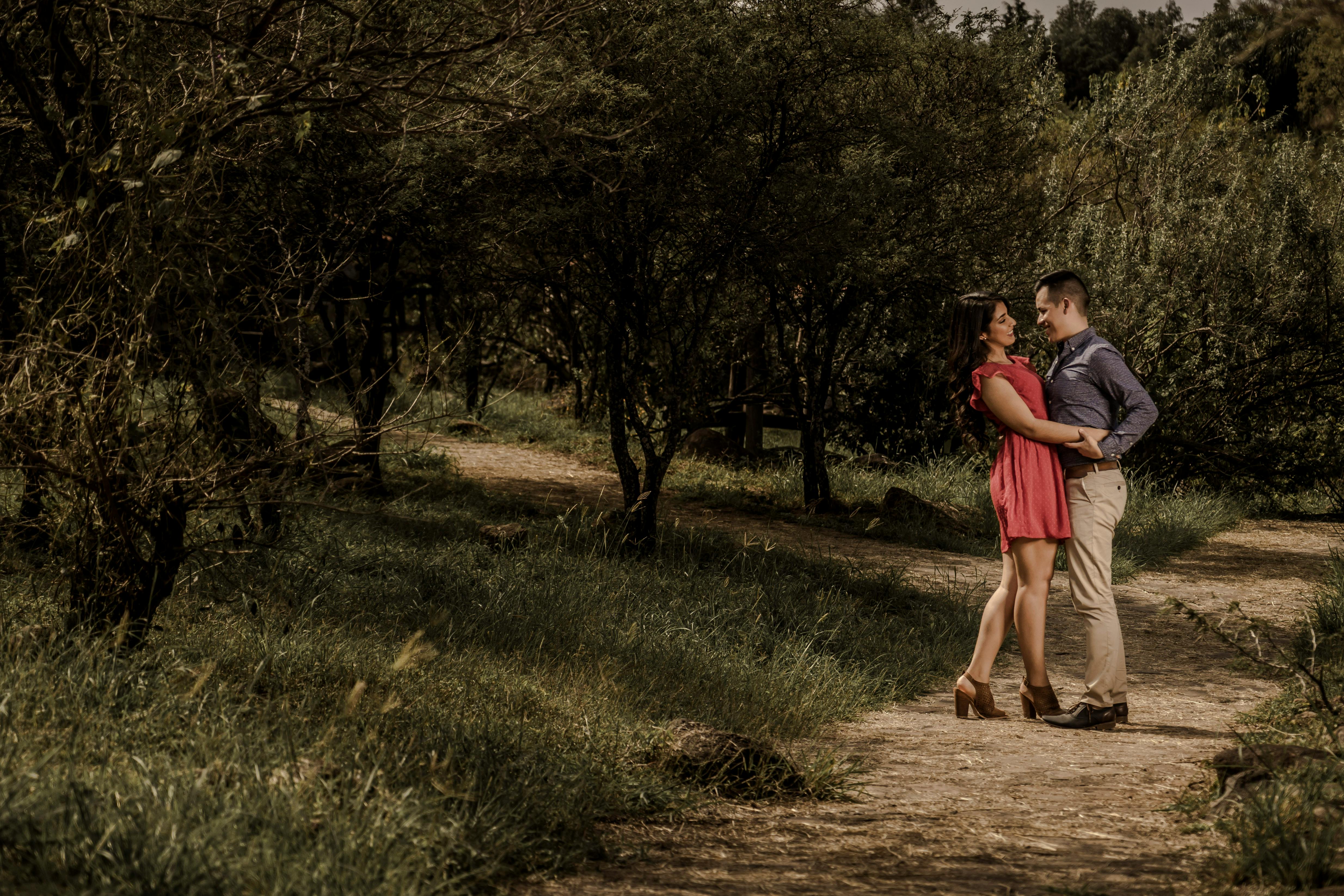 Romantic Couple Standing on the Pathway · Free Stock Photo