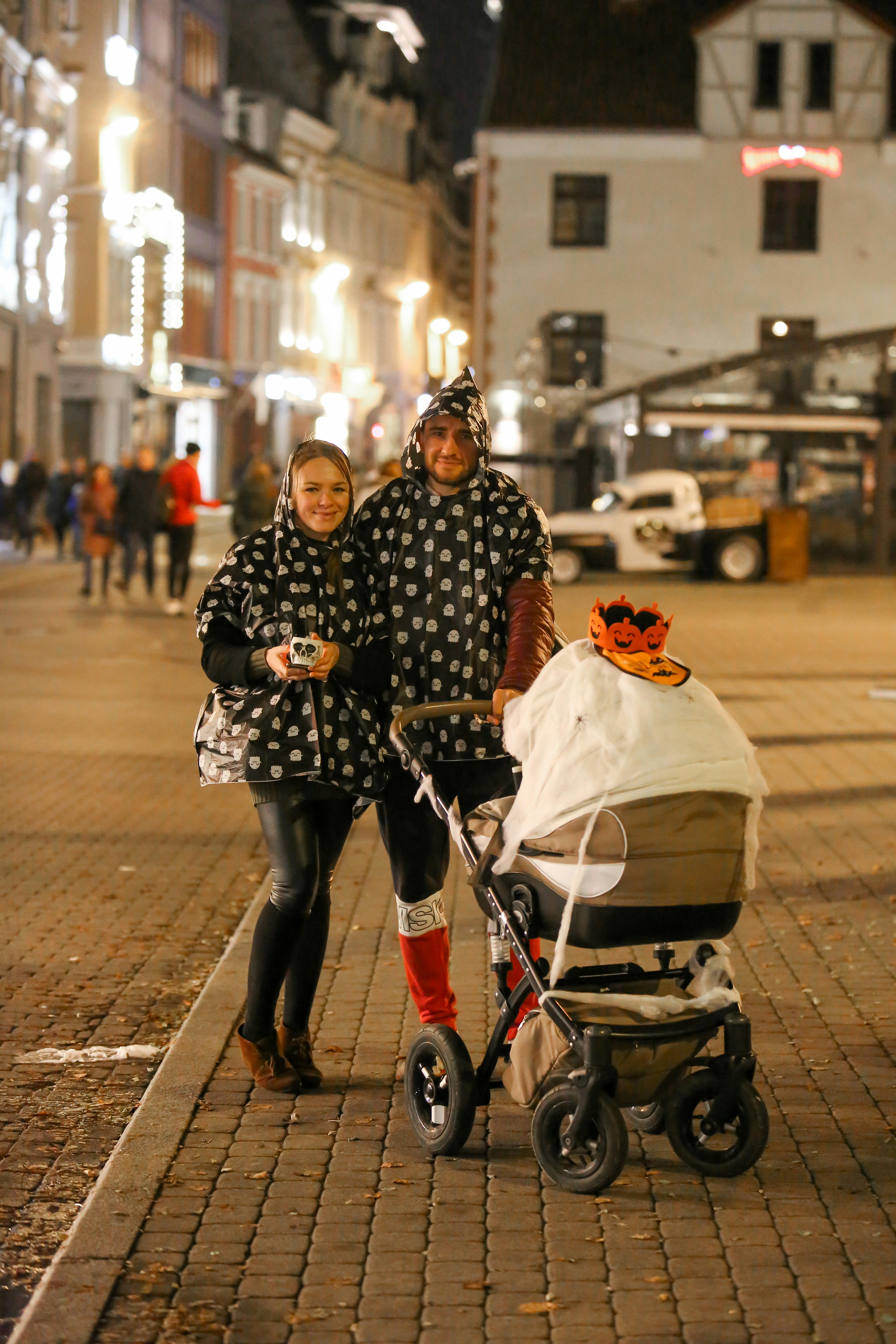A Family Walking on the Street · Free Stock Photo