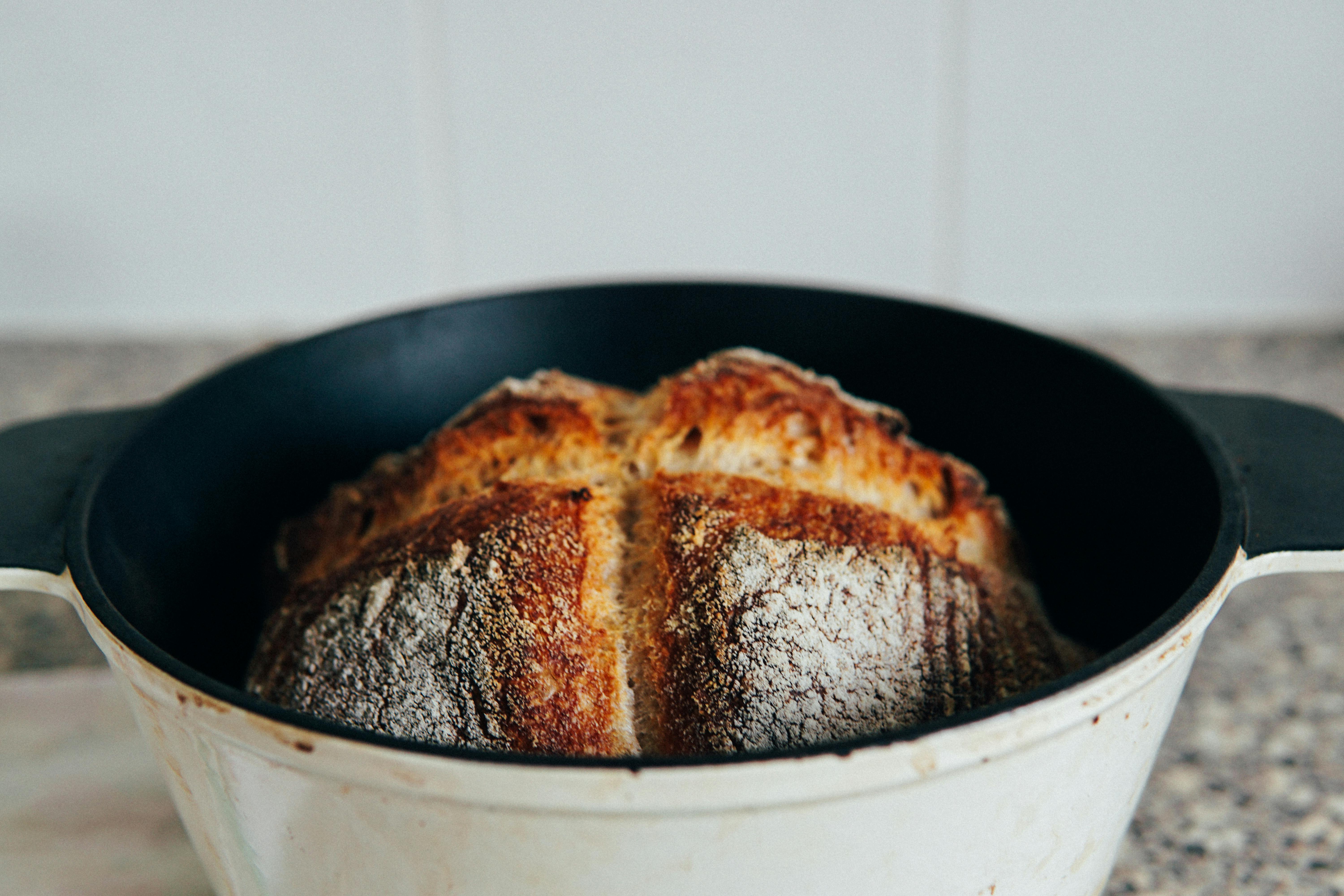 Fresh homemade baked bread in baking dish · Free Stock Photo