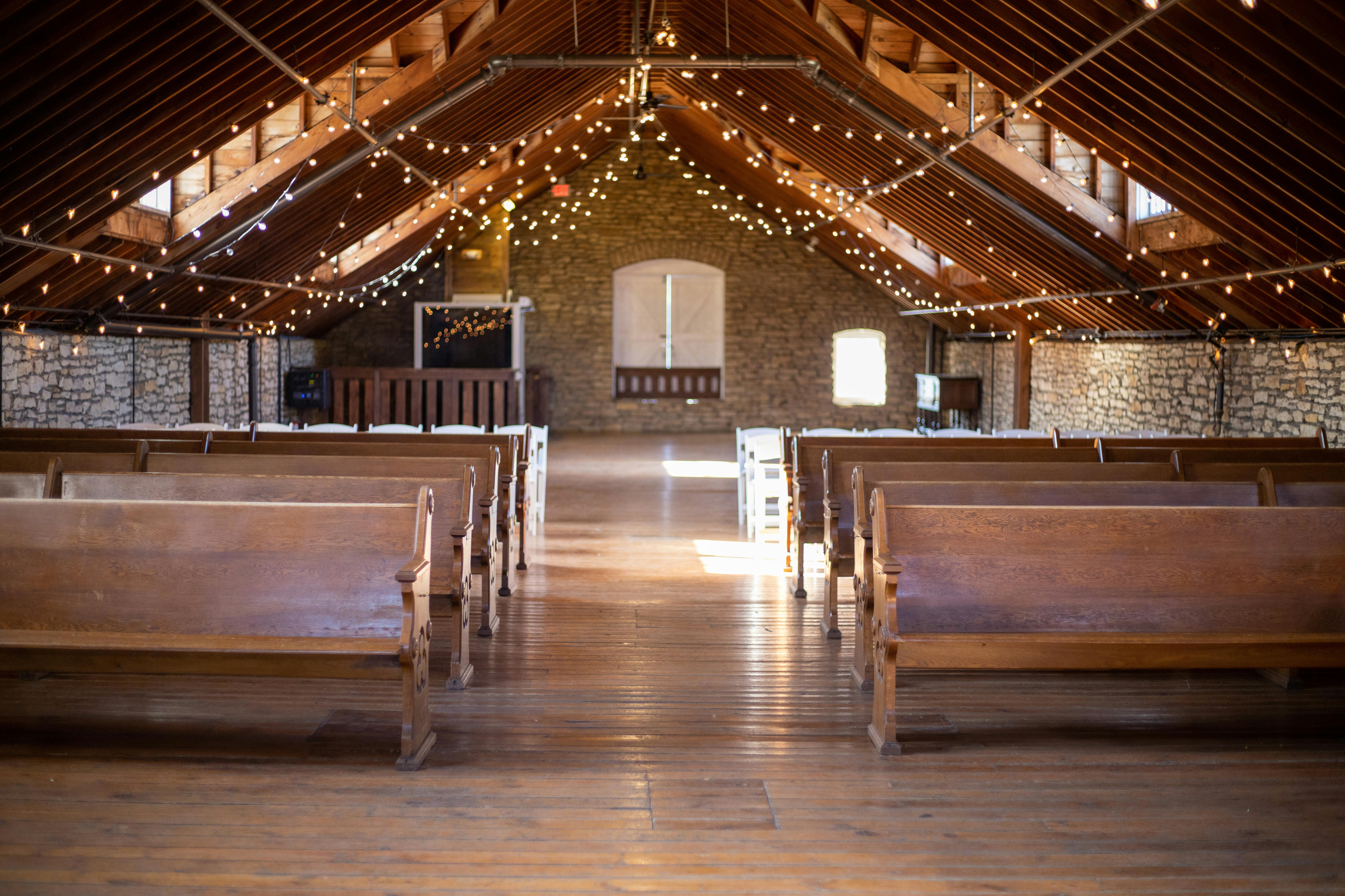 Brown Wooden Pews Inside a Chapel · Free Stock Photo