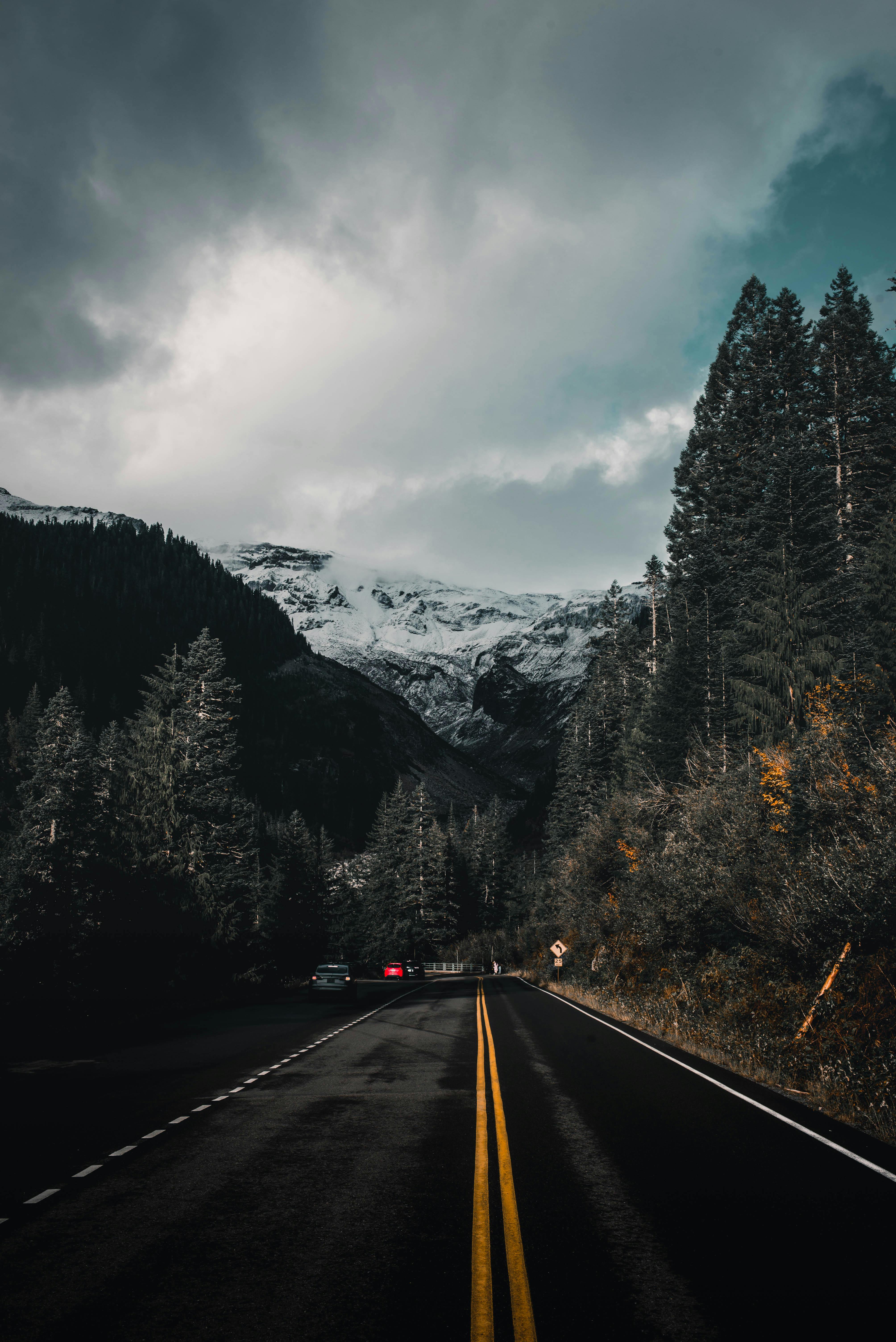 Brown Asphalt Road Beside Lake · Free Stock Photo