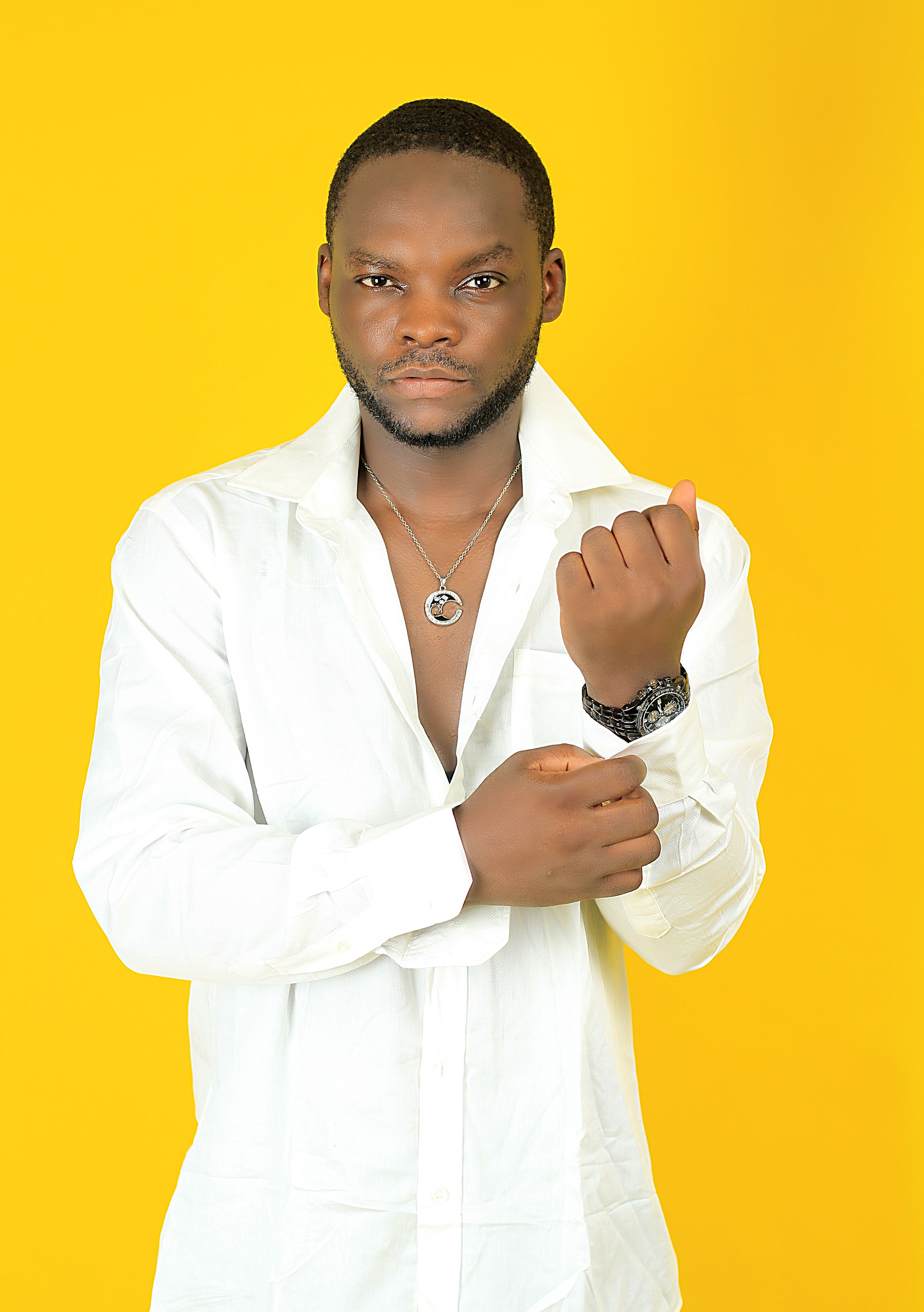 Man in White Long Sleeves Polo Seriously Looking at the Camera · Free ...