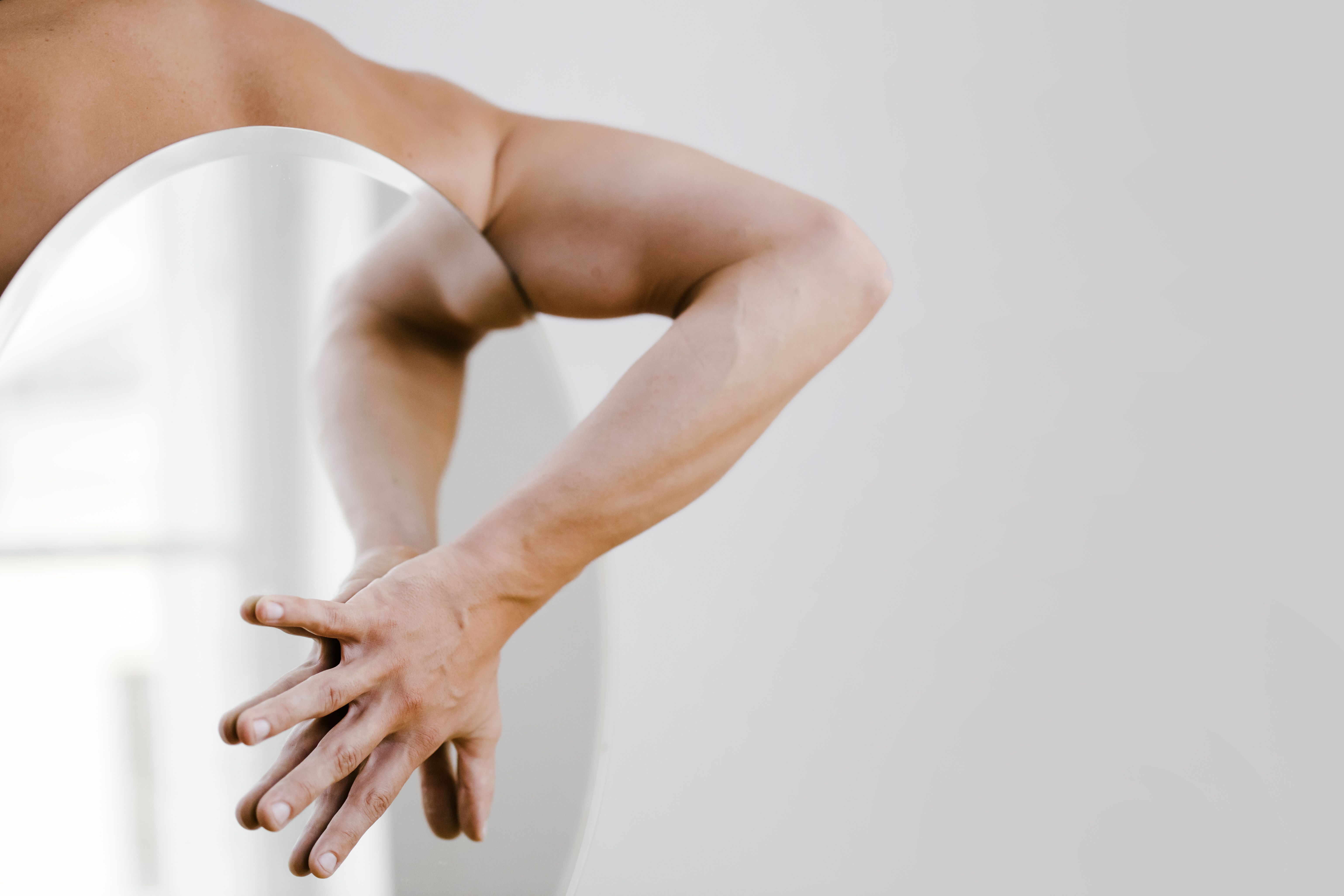 Person Holding Mirror in Desert · Free Stock Photo