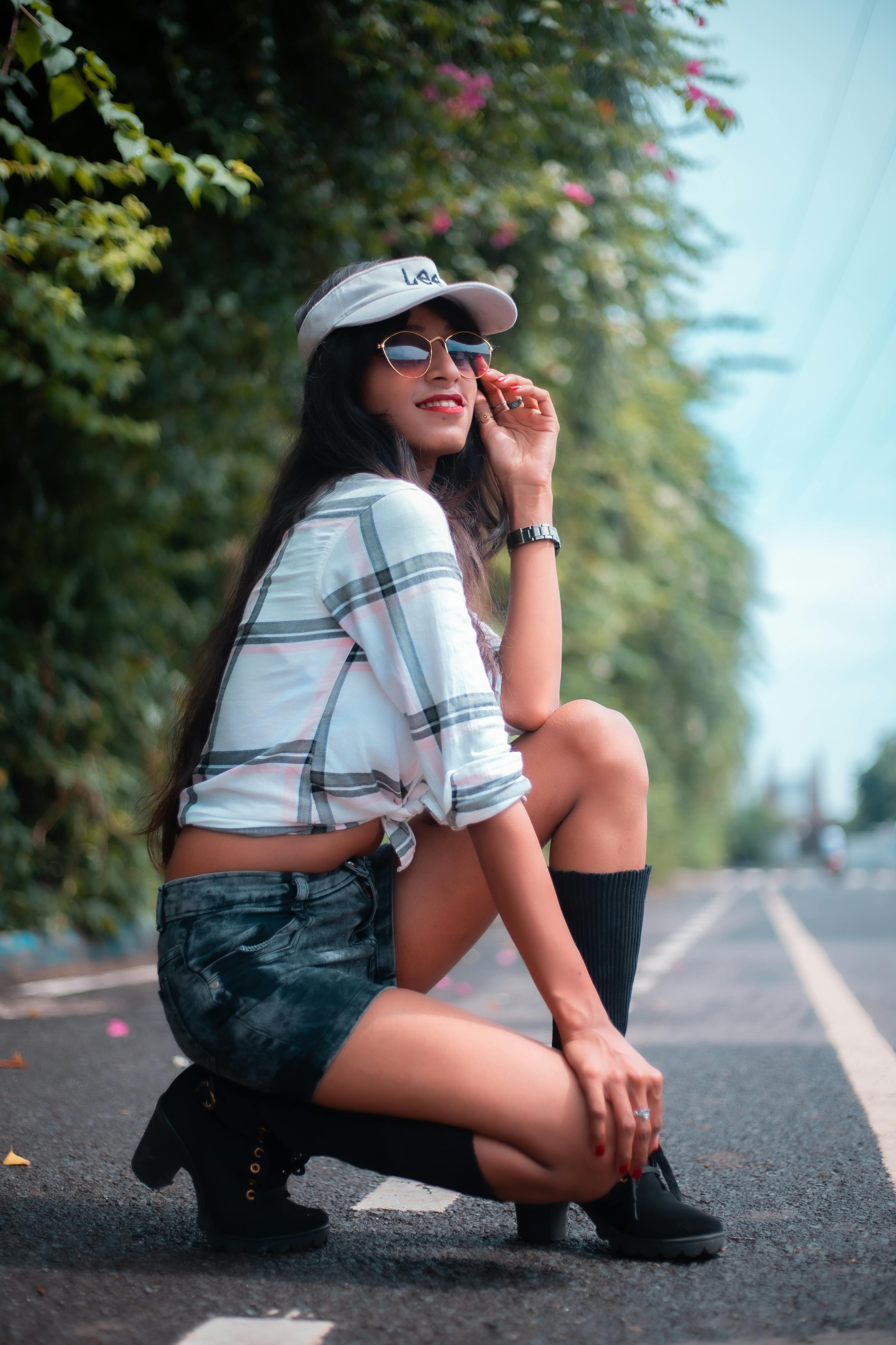 Woman Wearing Blue Denim Shorts Smiling · Free Stock Photo