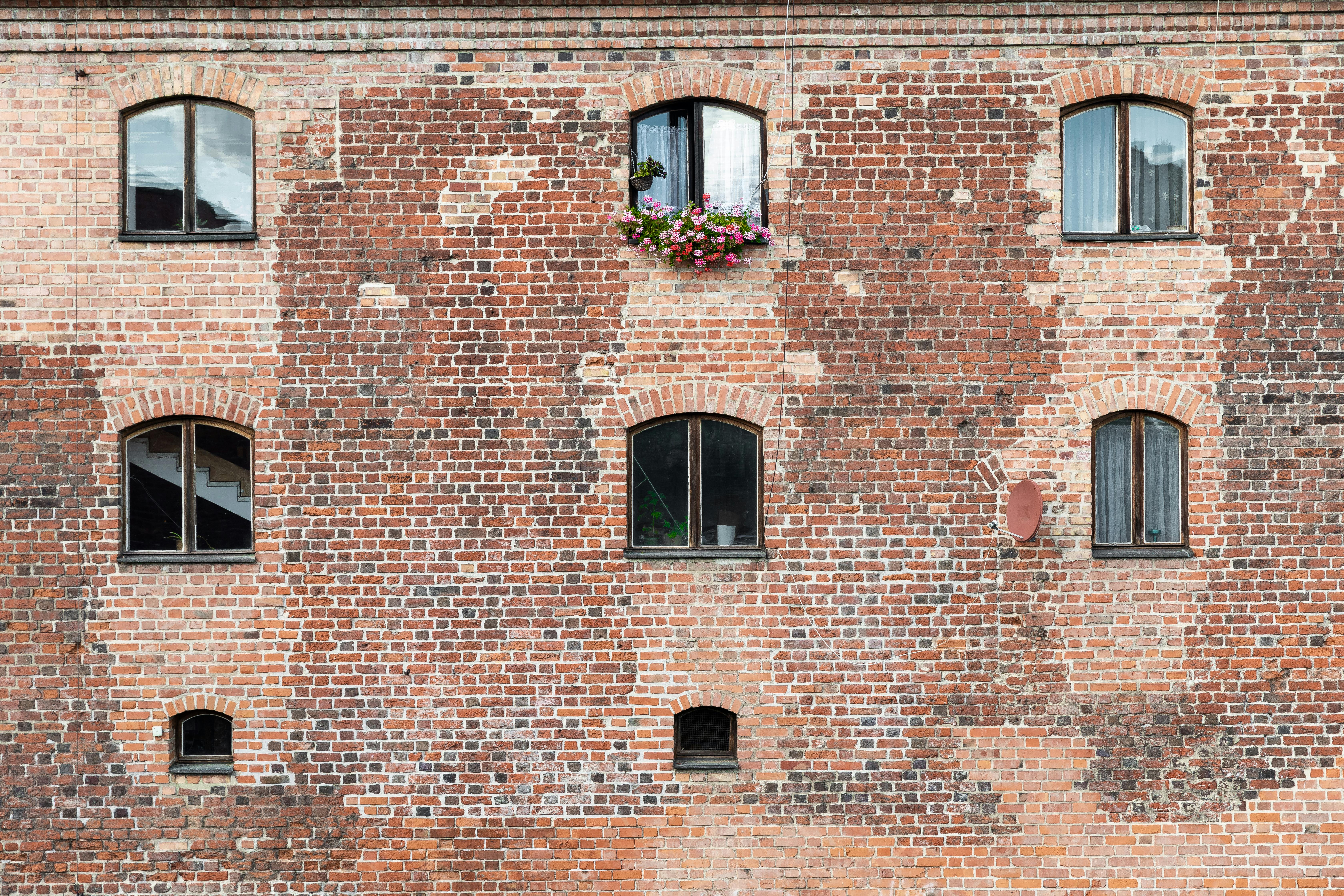 Glass Windows on a Brick Wall · Free Stock Photo