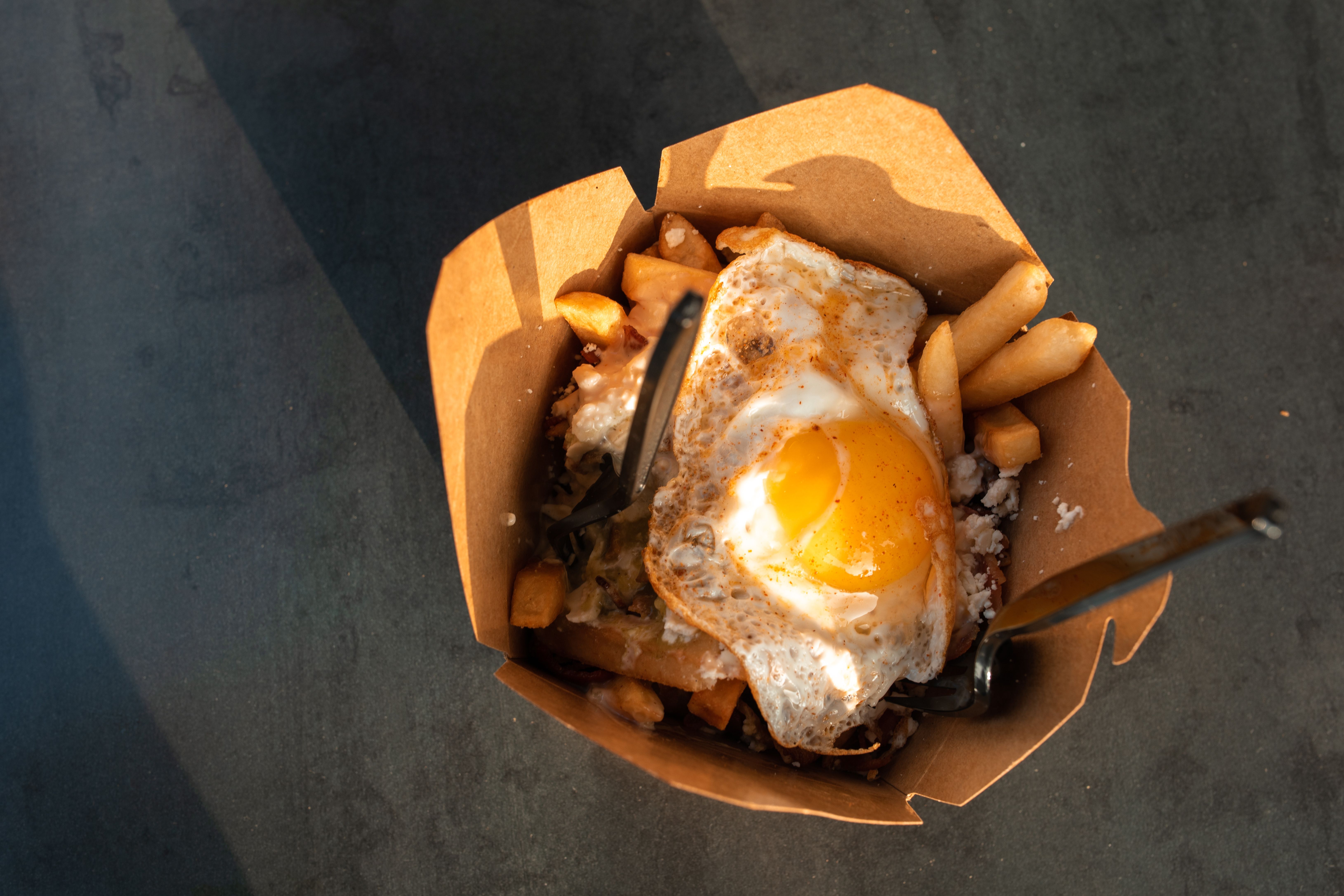 Sunny Side Up in a Take Out Box · Free Stock Photo