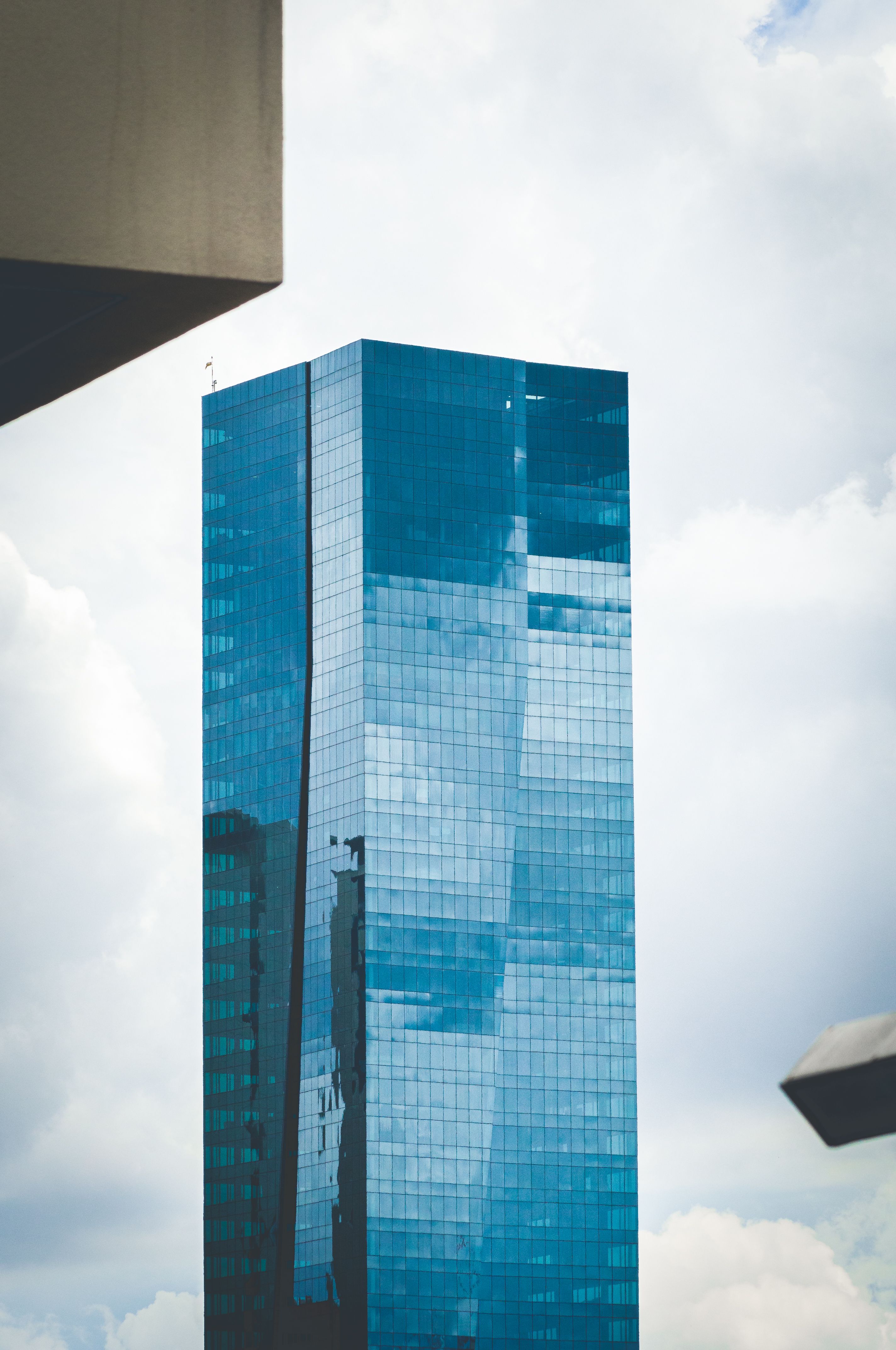 Aerial view of skyscraper spires in contemporary city · Free Stock Photo
