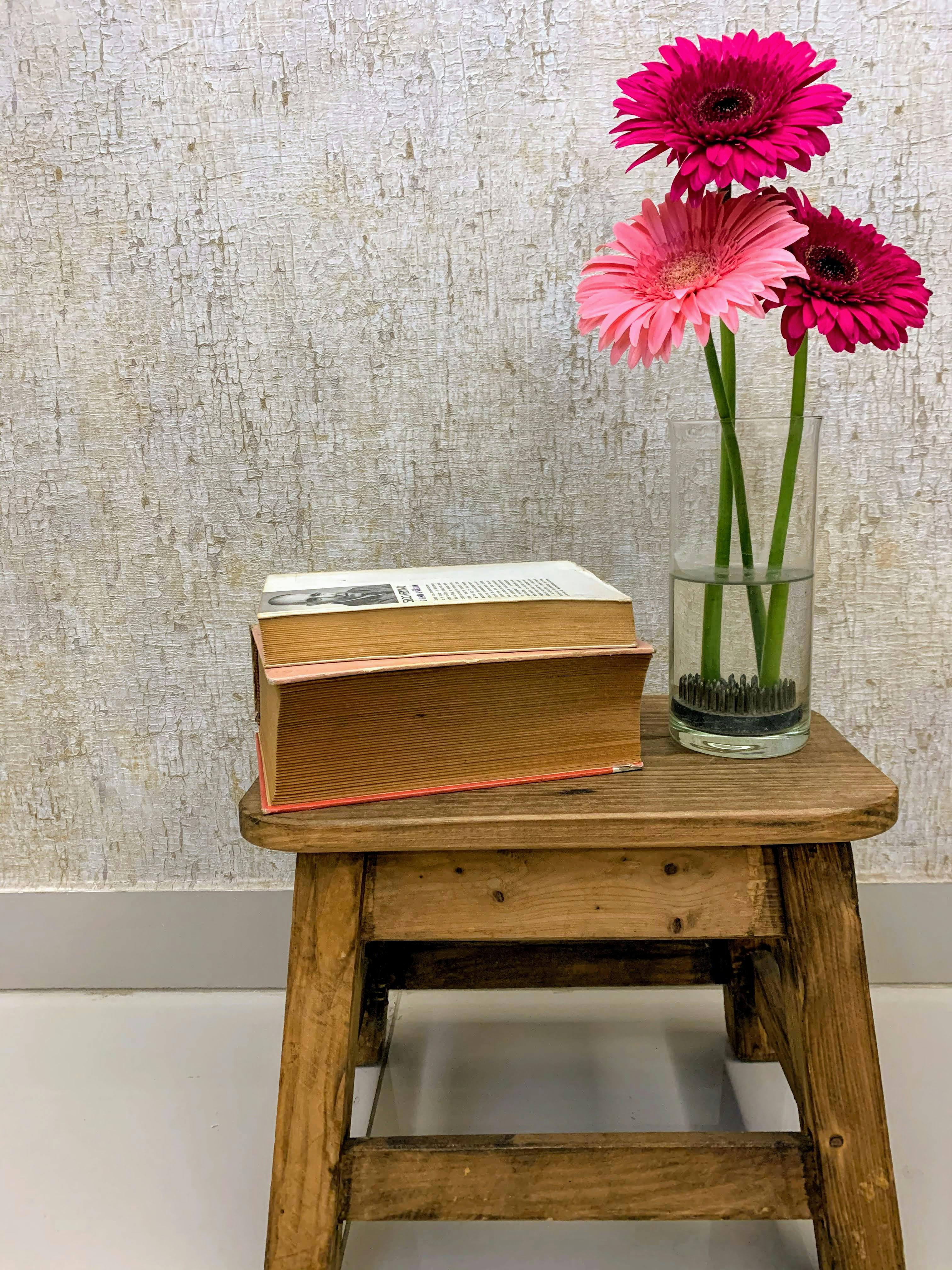 2 Books on Top of Each Other Beside Red Apple Fruit · Free Stock Photo