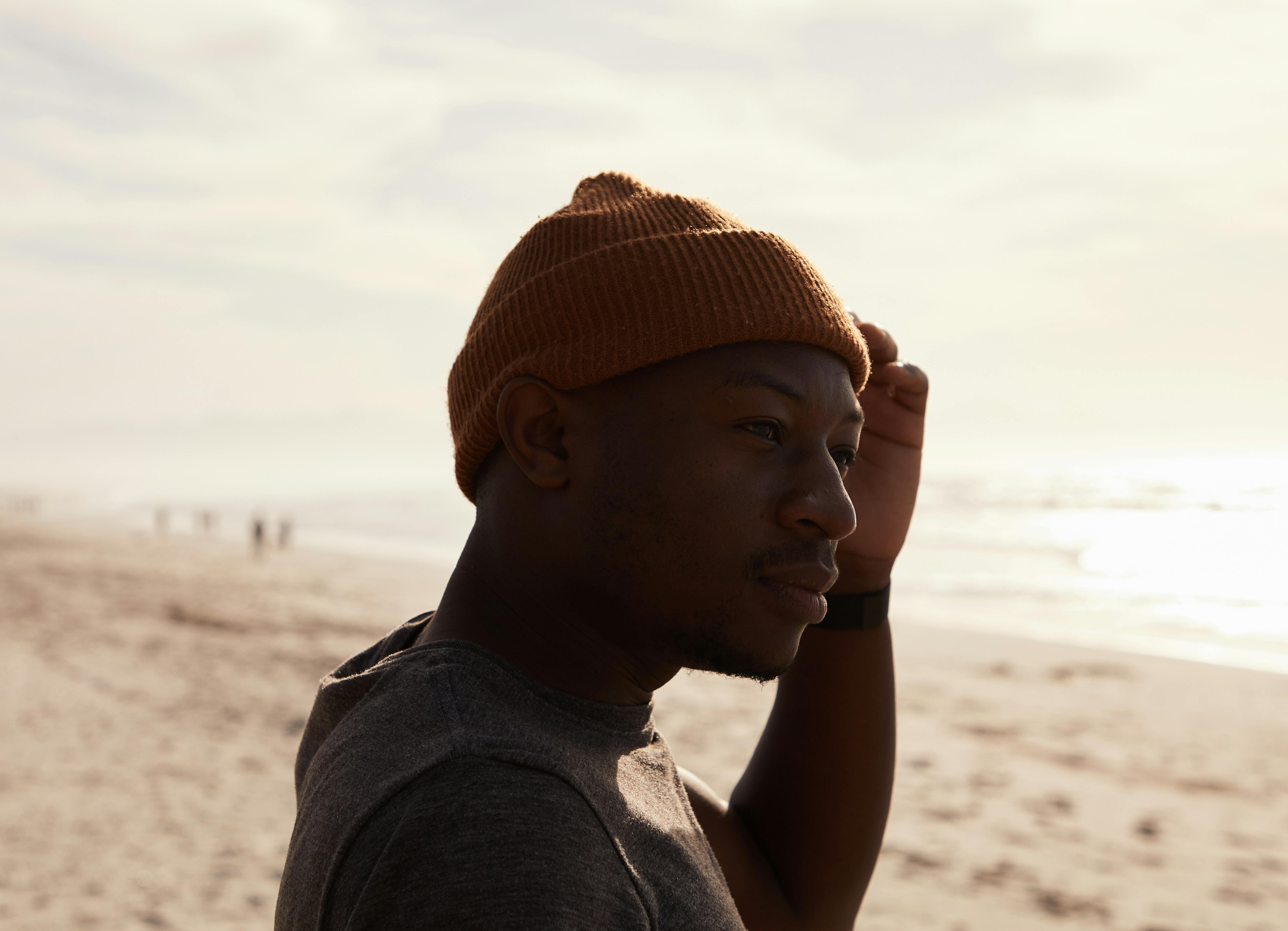 Positive black man in nature · Free Stock Photo