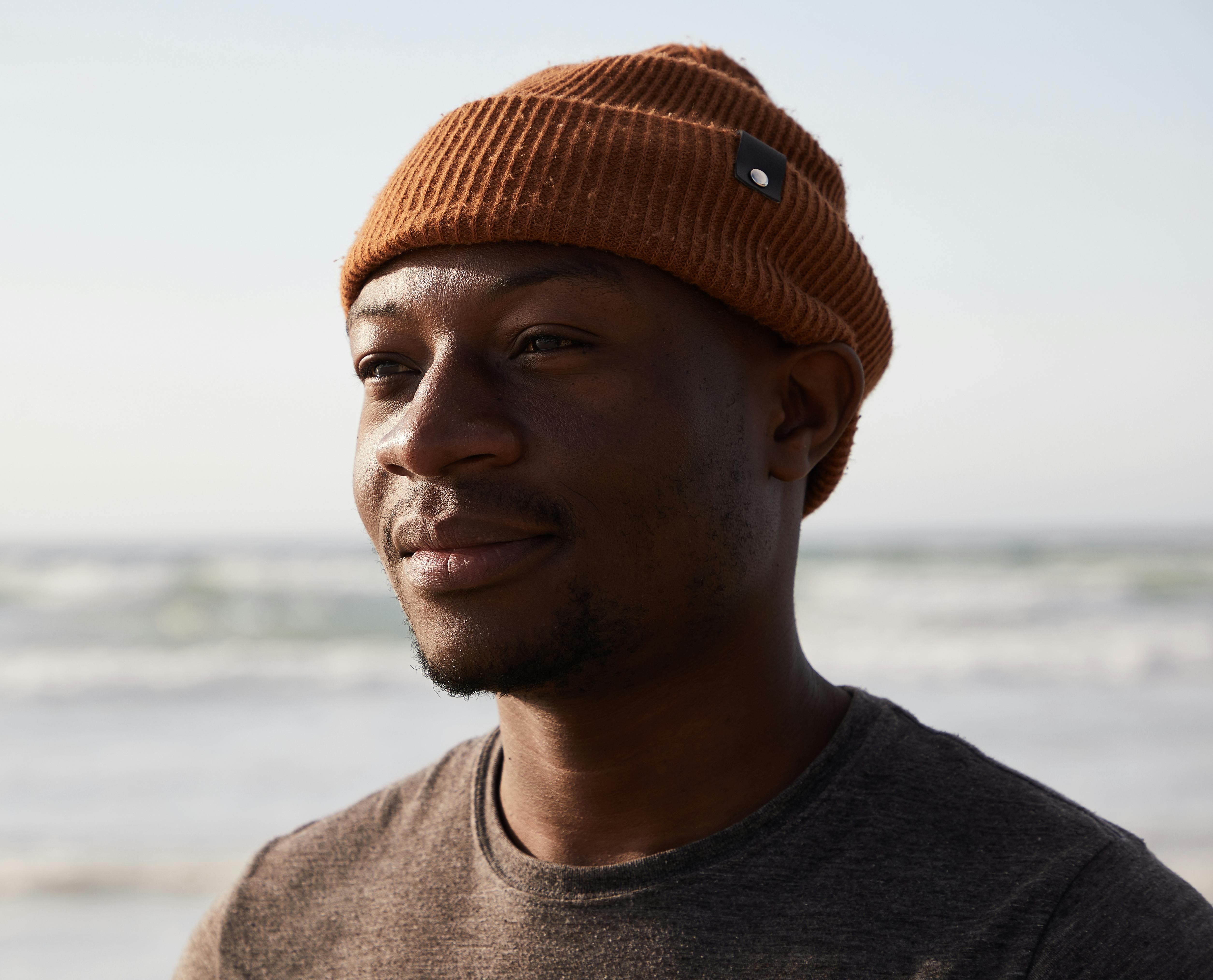 Positive black man in nature · Free Stock Photo