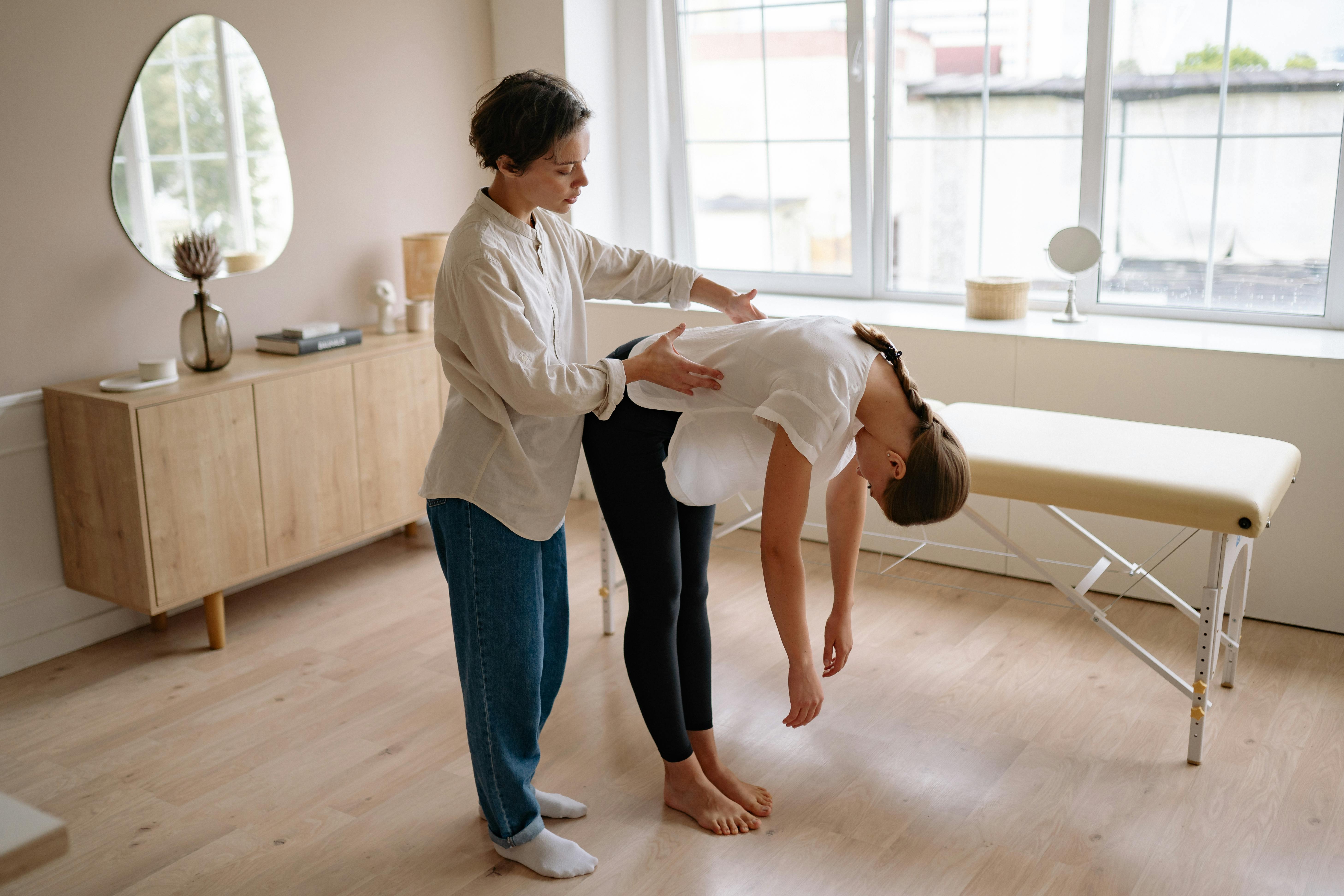 A Woman Bending Her Body Forward · Free Stock Photo