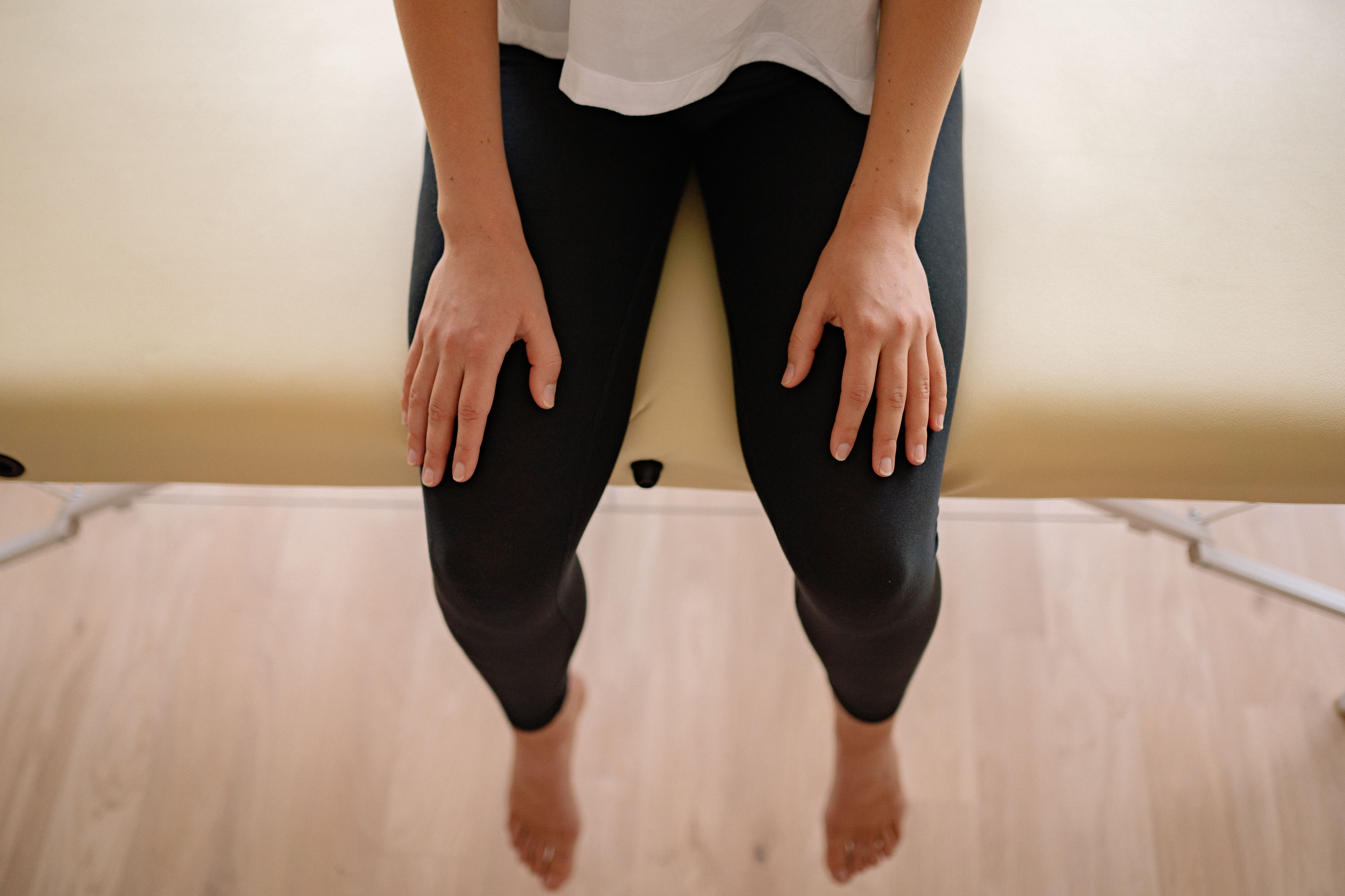 Female Feet under Table · Free Stock Photo