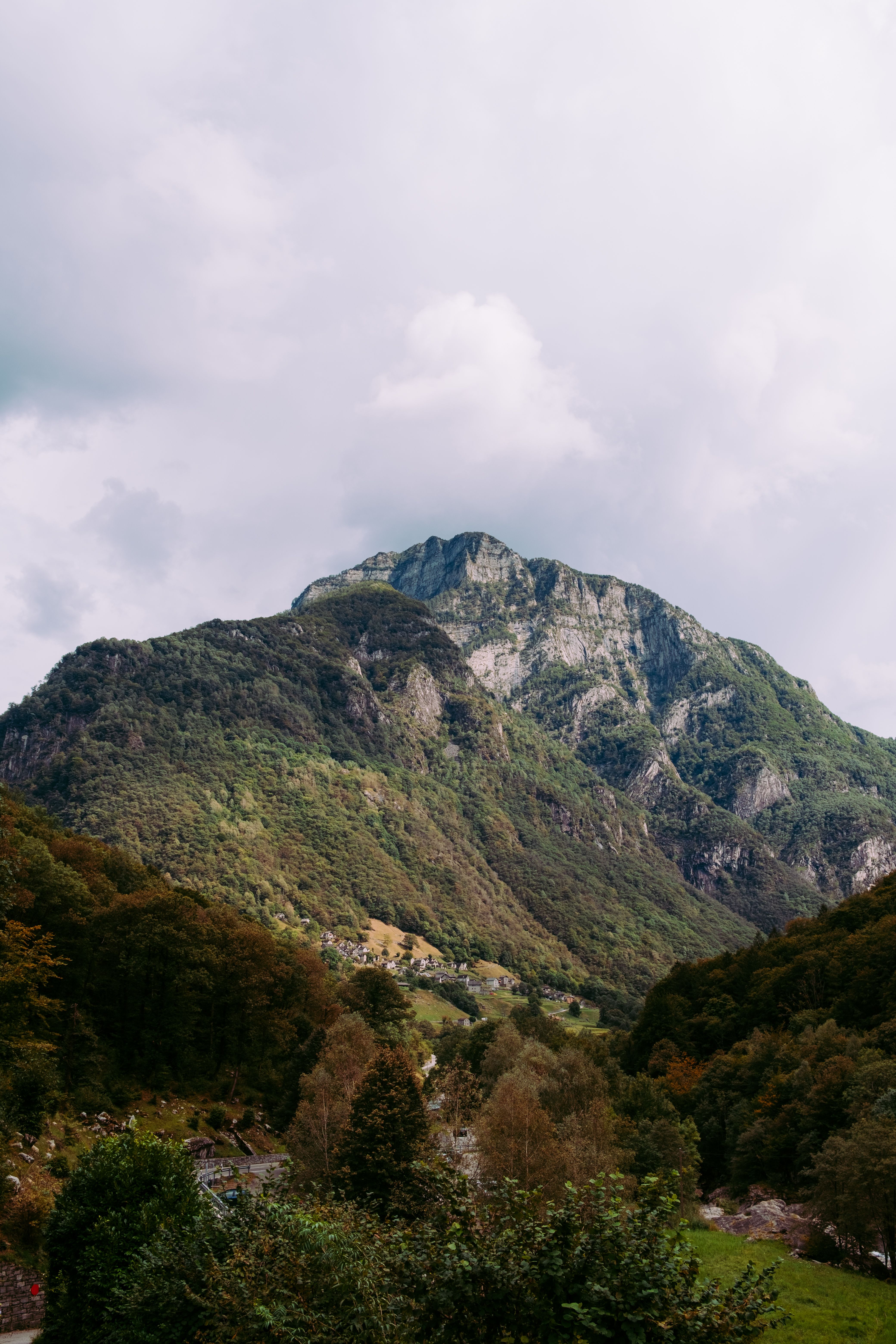 Mountain ridge with green plants in valley · Free Stock Photo
