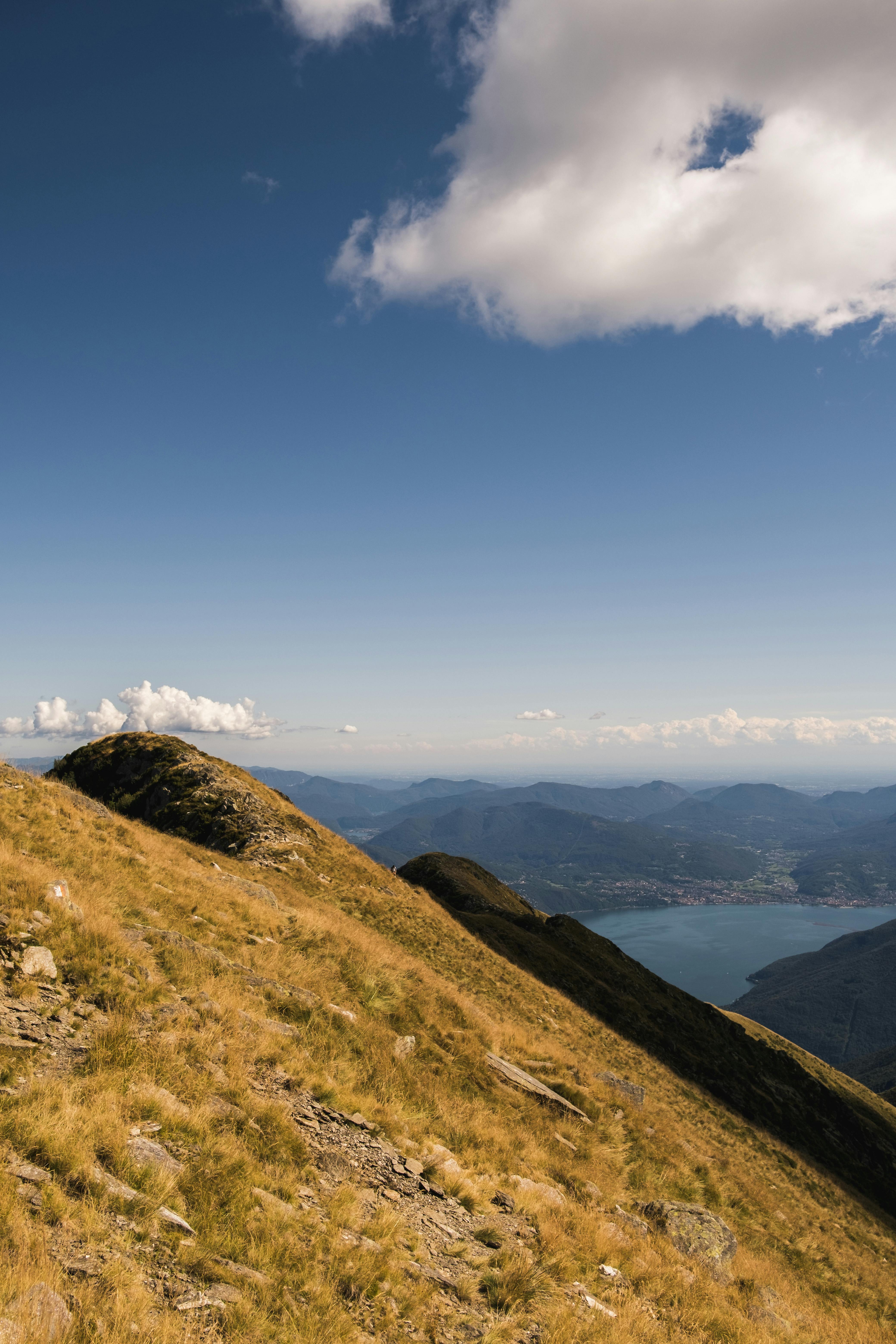 Mountain slope with growing grass in high valley · Free Stock Photo