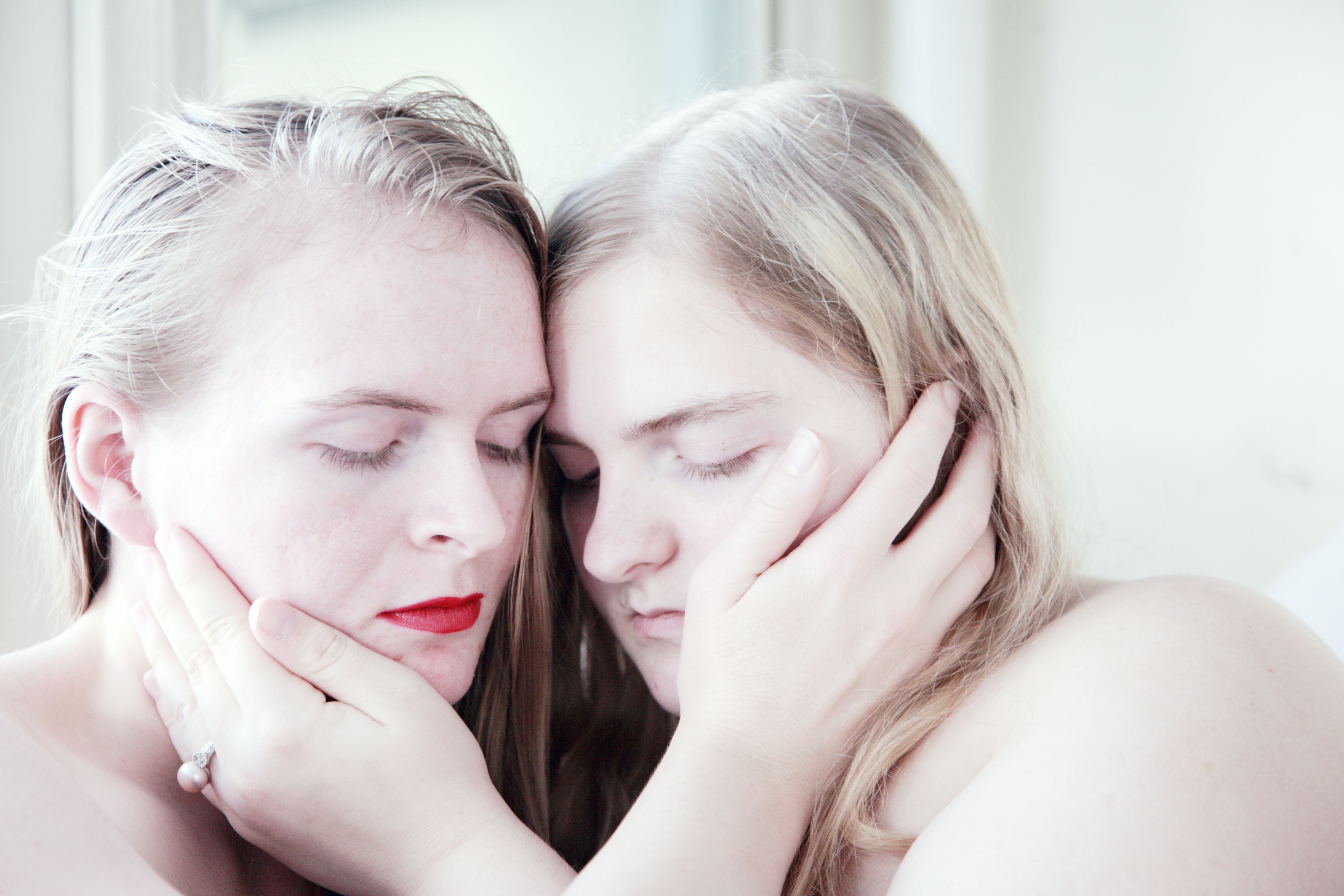 A Woman Couple Cuddling Each Other · Free Stock Photo