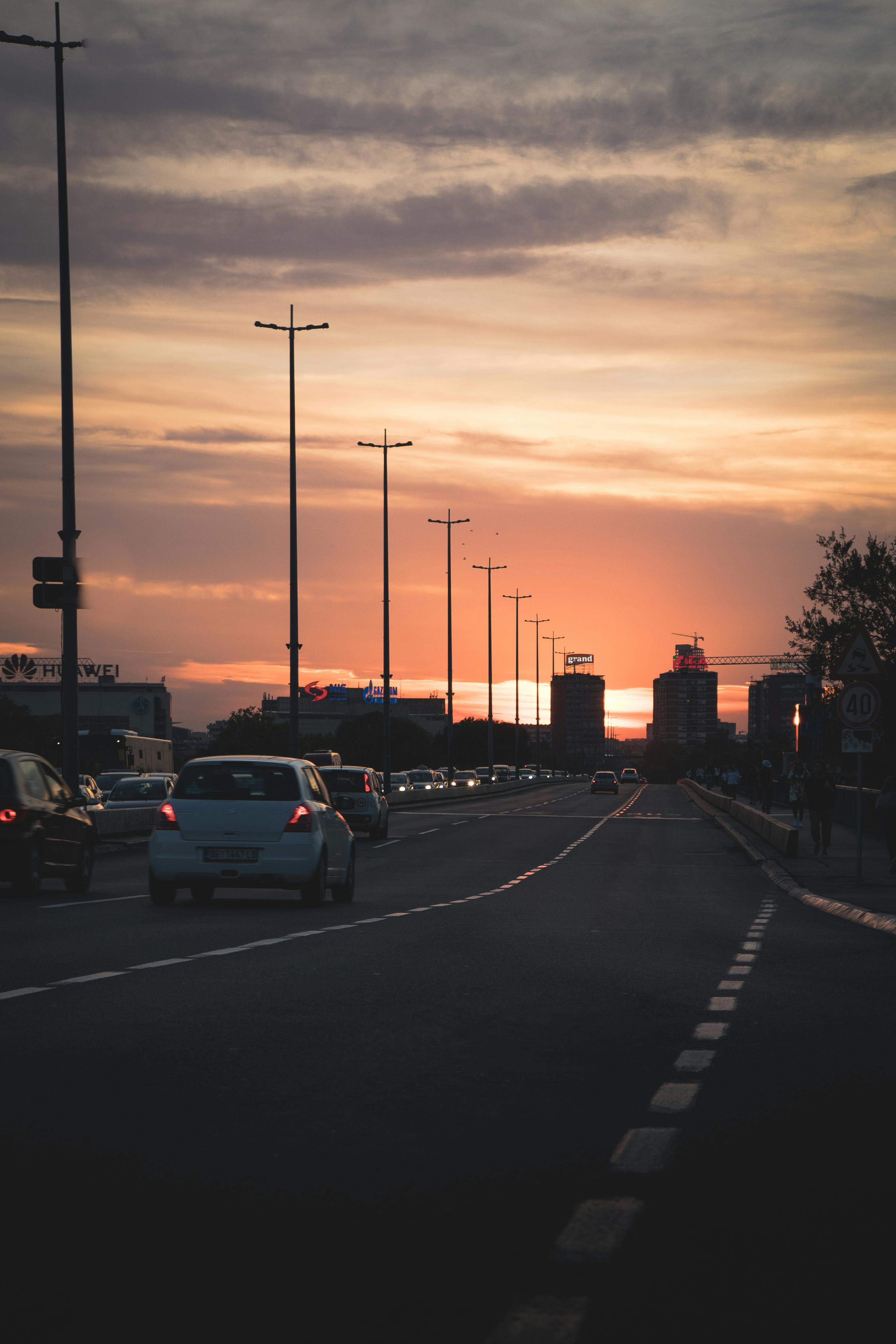 Cars on Road during Sunset · Free Stock Photo