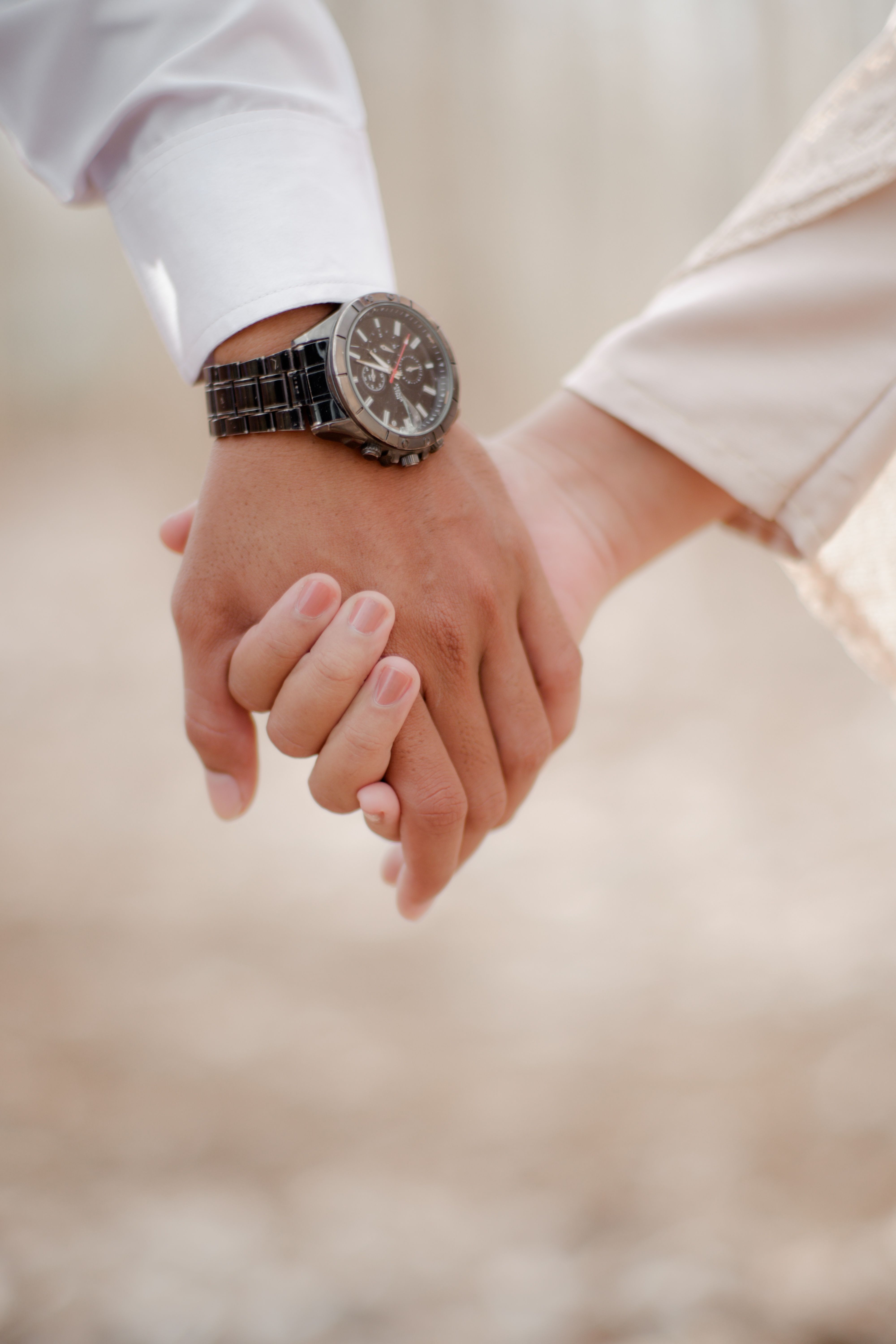 A Couple Holding Hands · Free Stock Photo