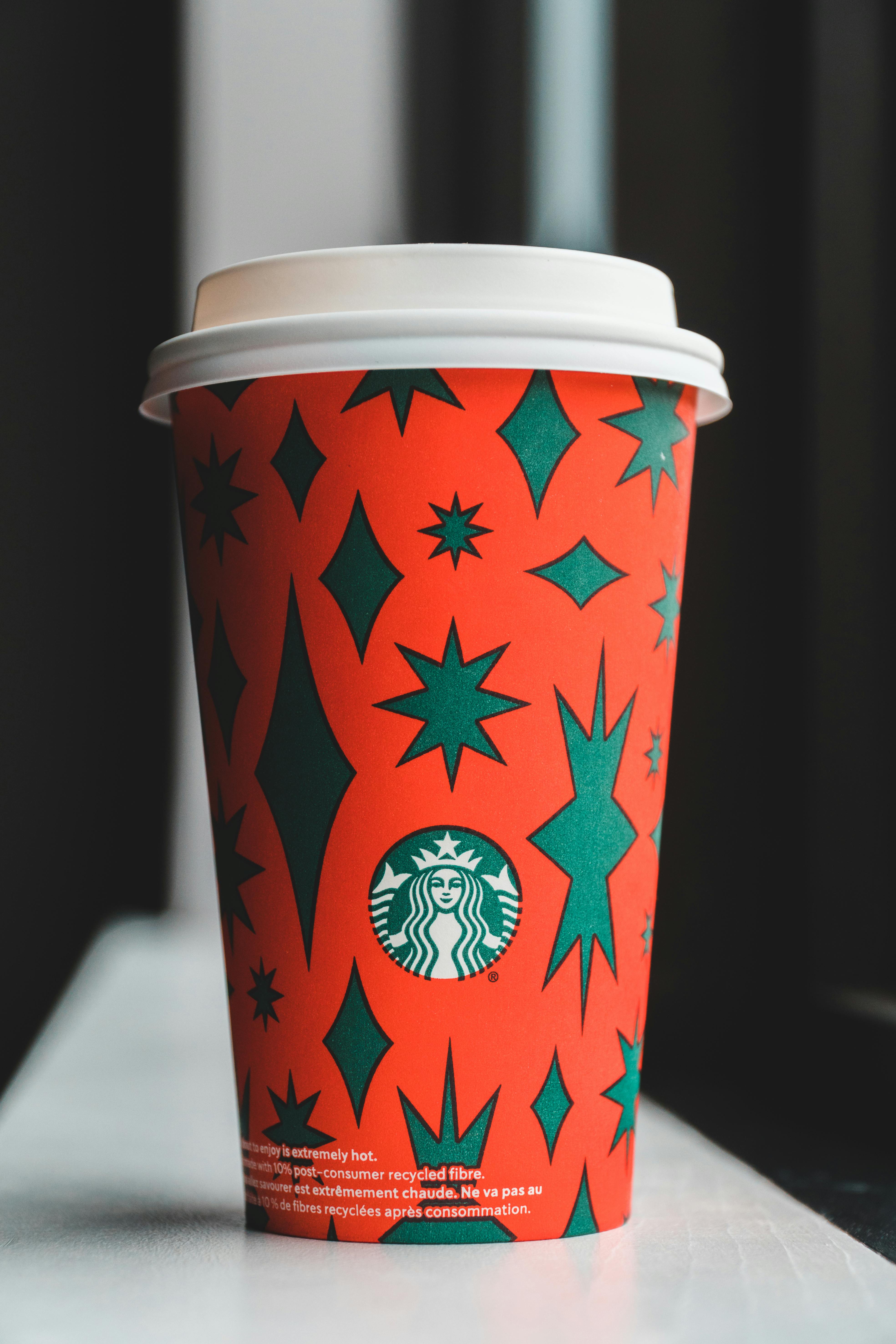 Plastic cup with label and geometric pattern · Free Stock Photo