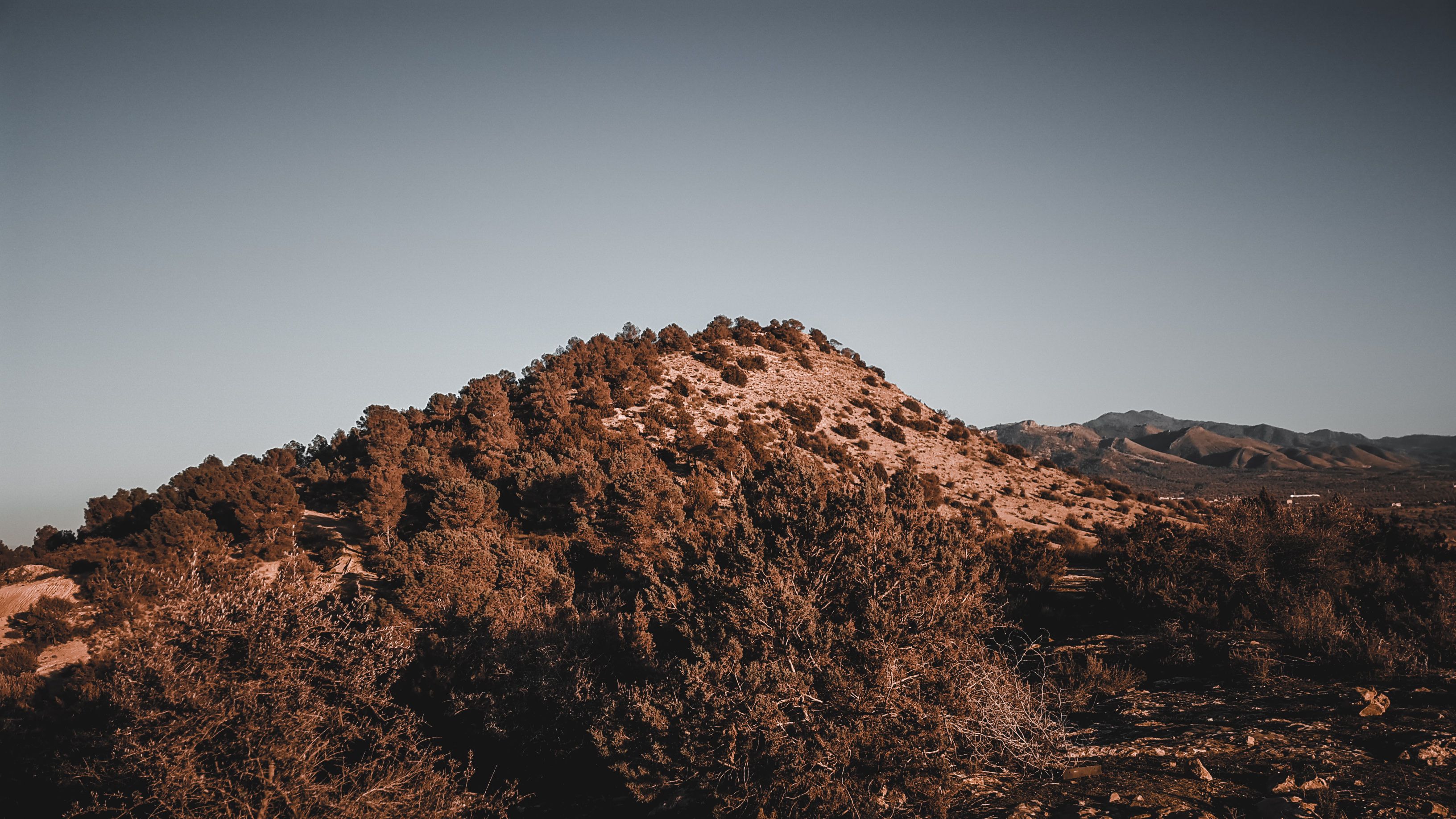 Brown Rocky Mountain Under Clear Sky · Free Stock Photo