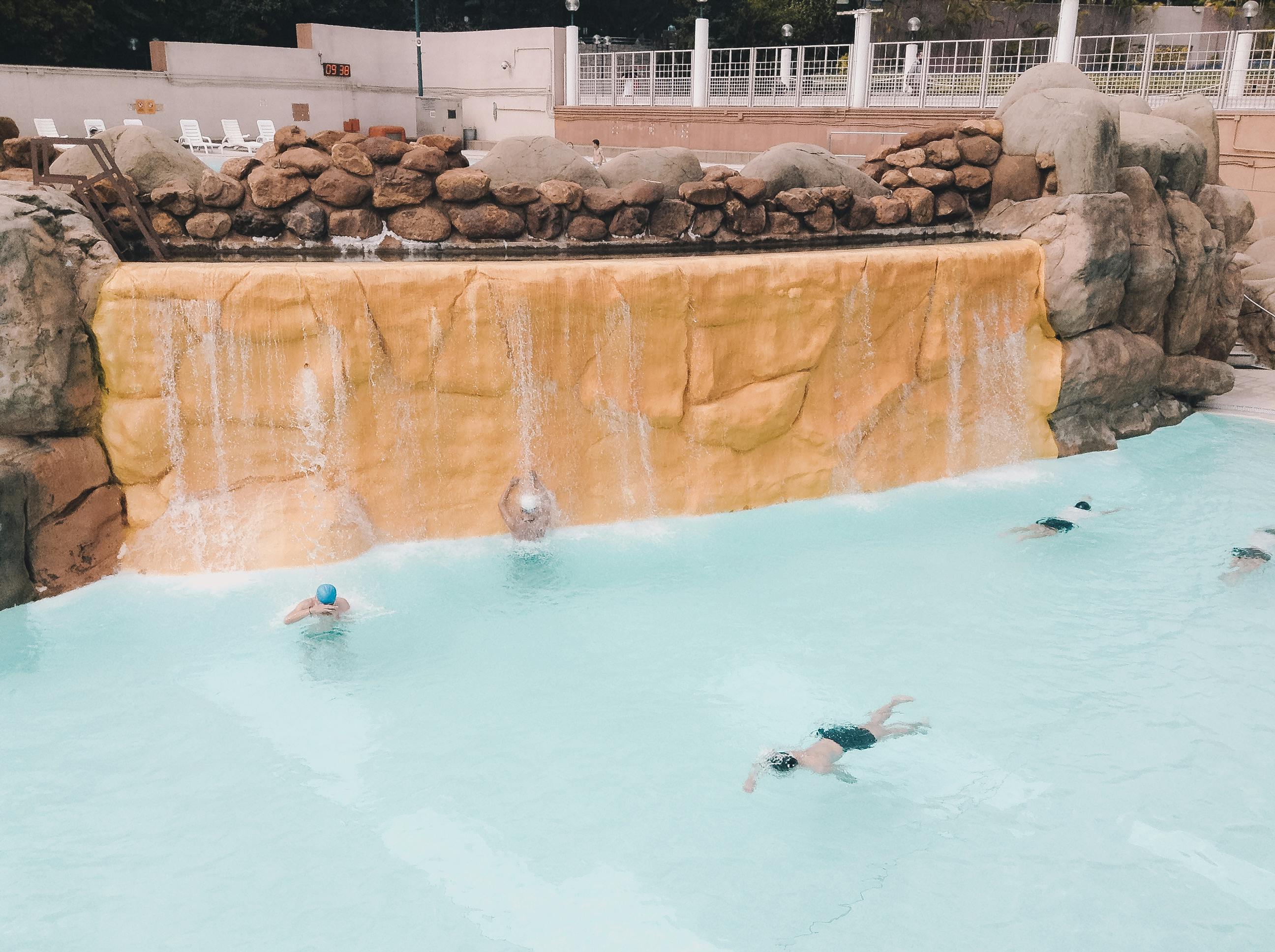 People Swimming on Pool · Free Stock Photo
