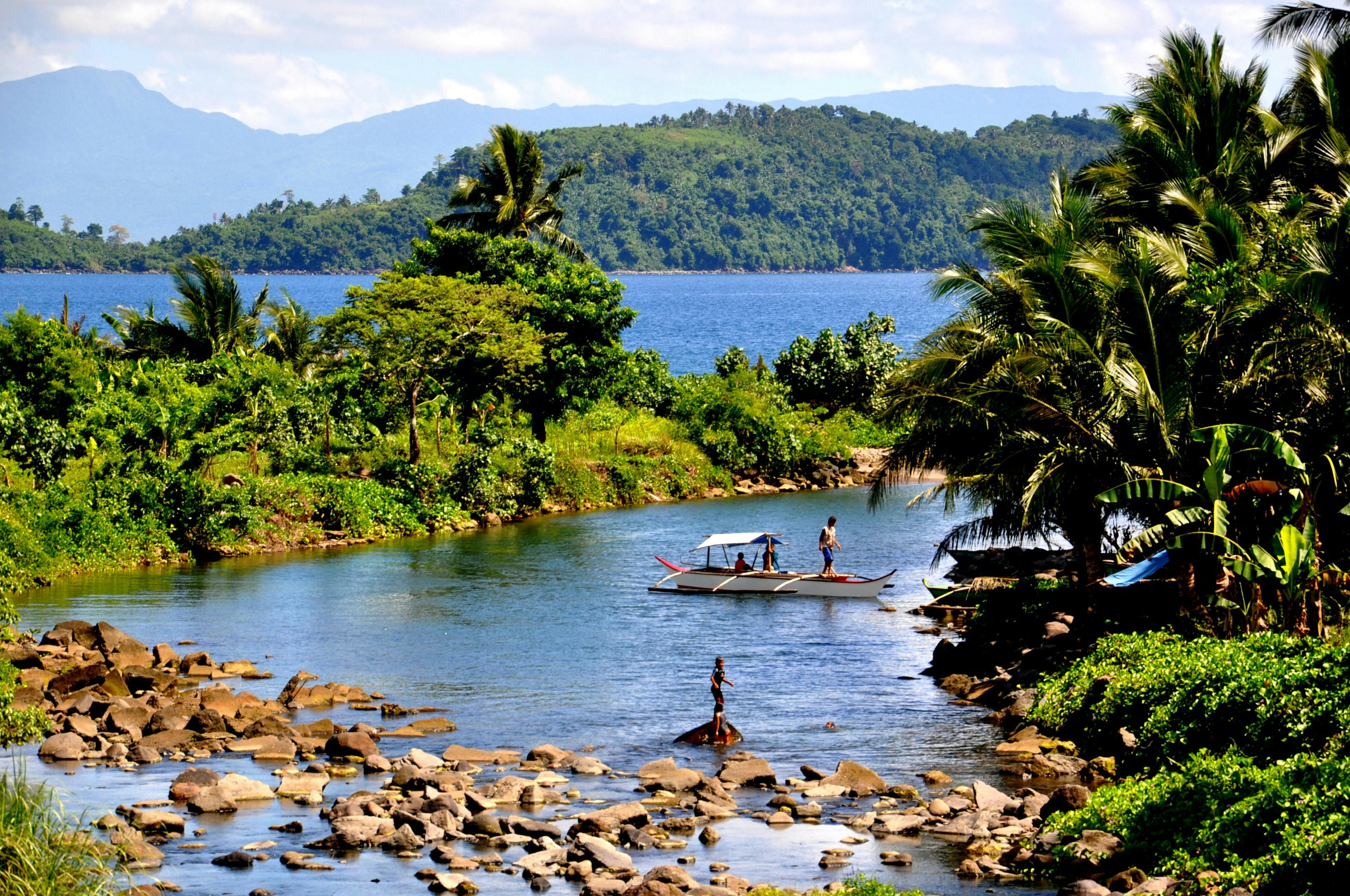 People Riding a Boat on River · Free Stock Photo