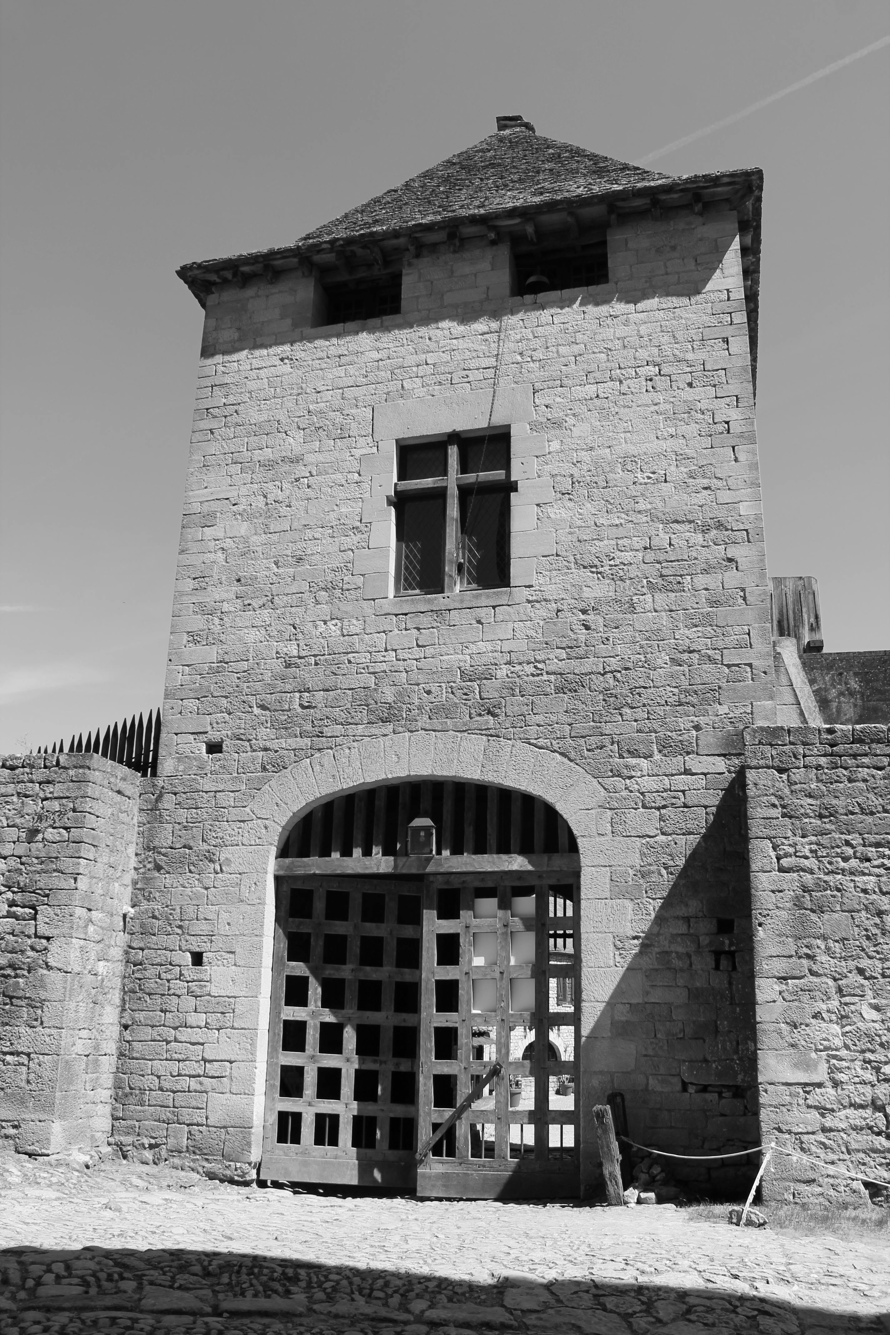 Grayscale Photo of Brick Building · Free Stock Photo