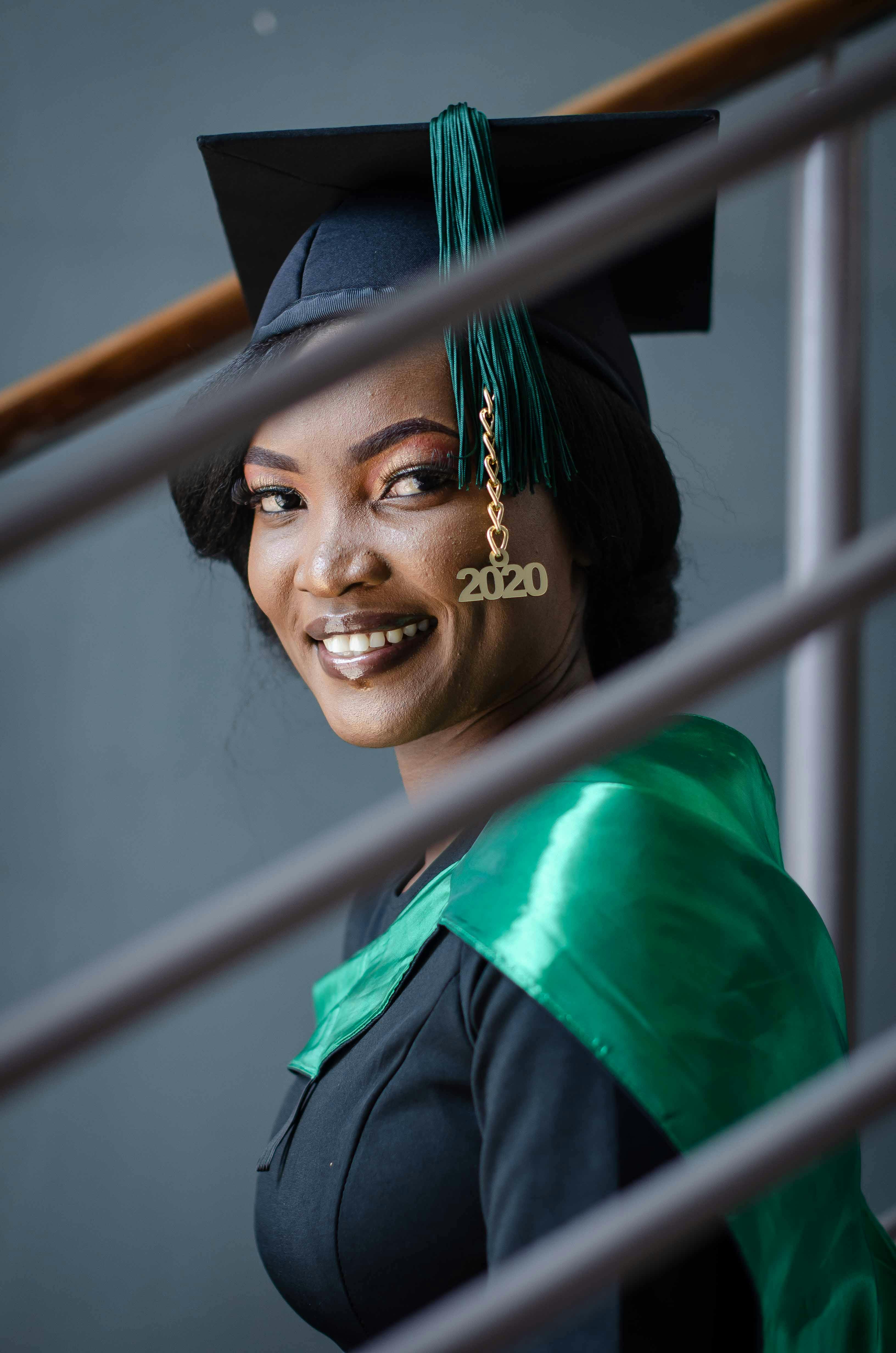A Woman Wearing an Academic Regalia · Free Stock Photo