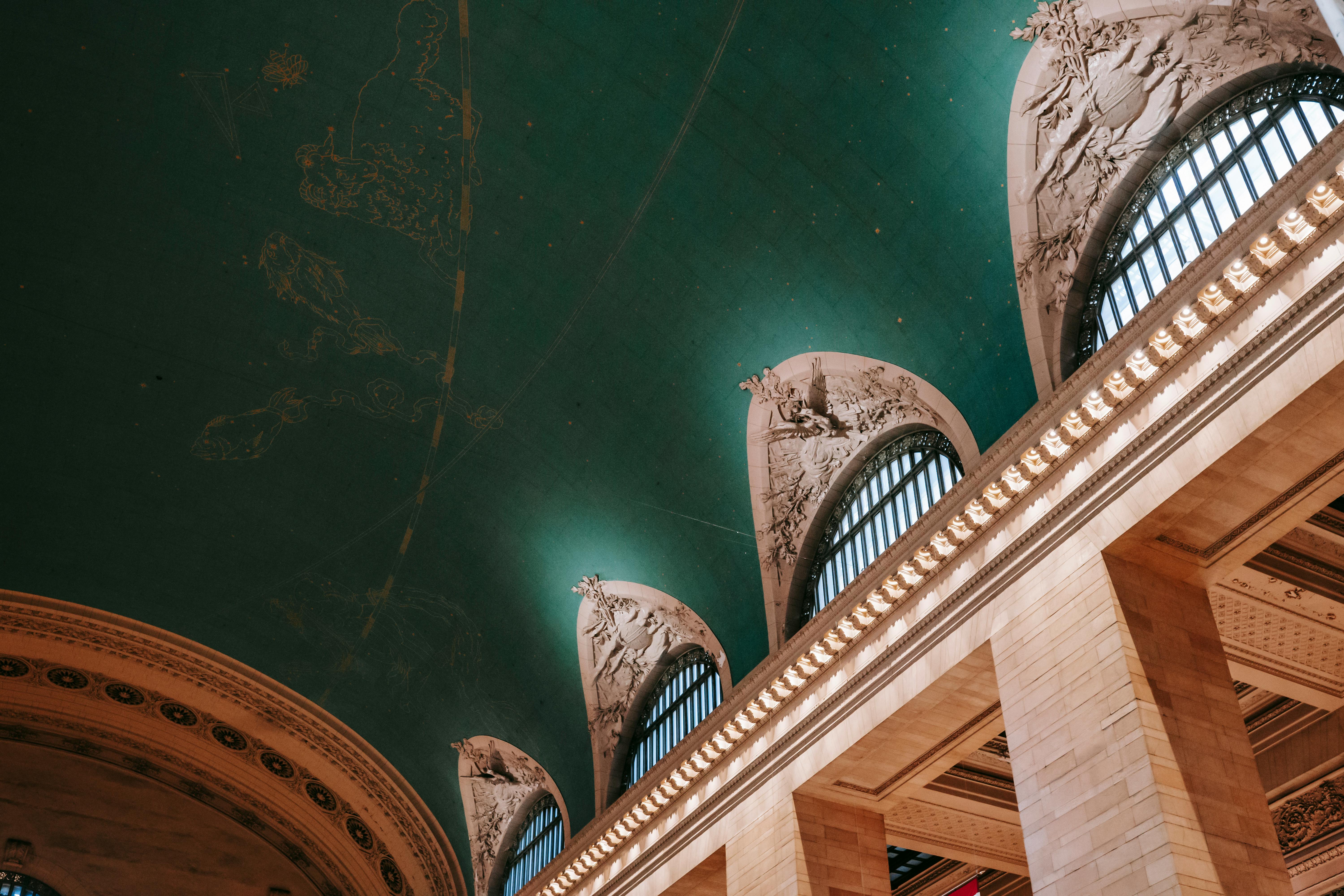 Modern building passageway with arched windows · Free Stock Photo