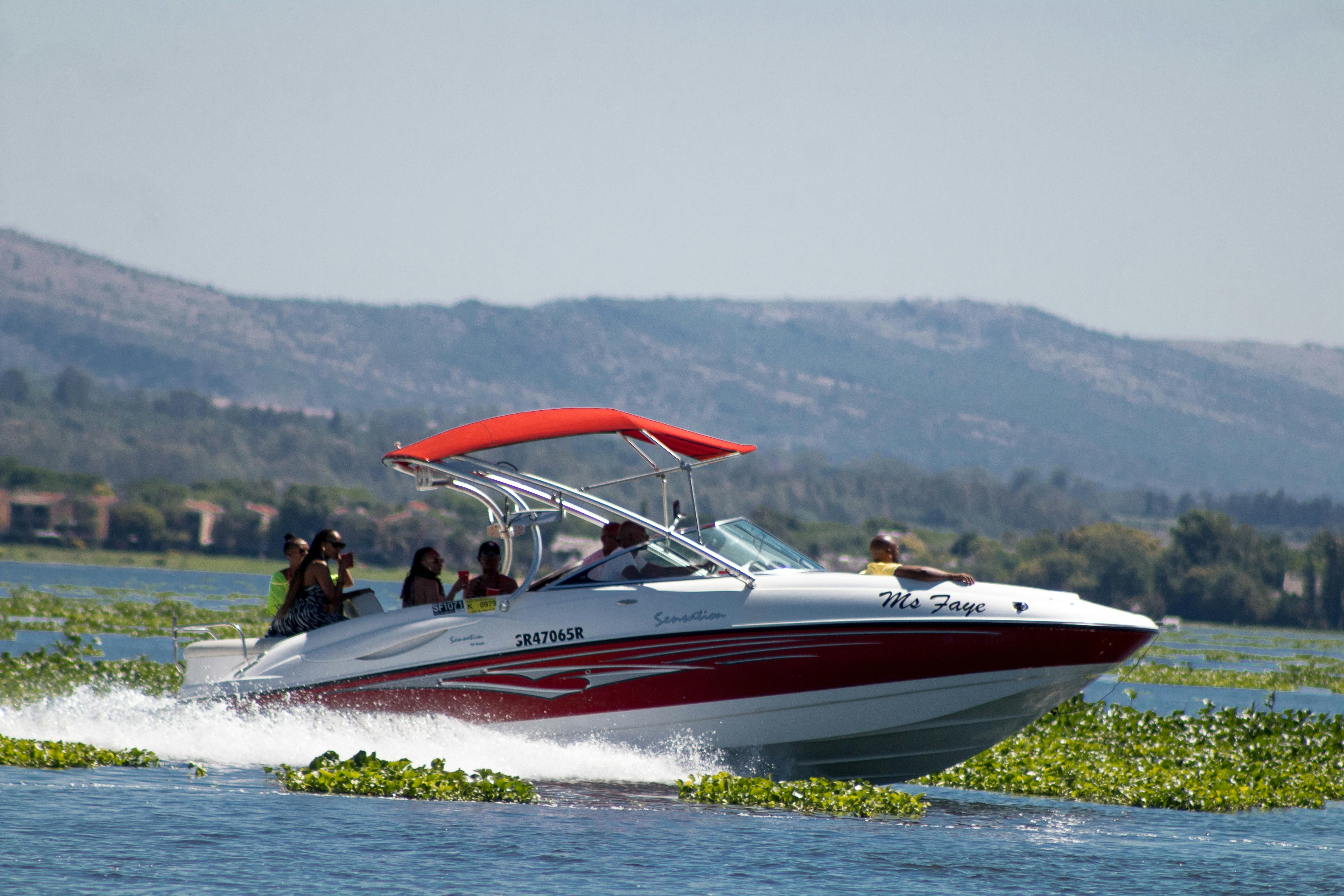 People Riding on a Speedboat · Free Stock Photo