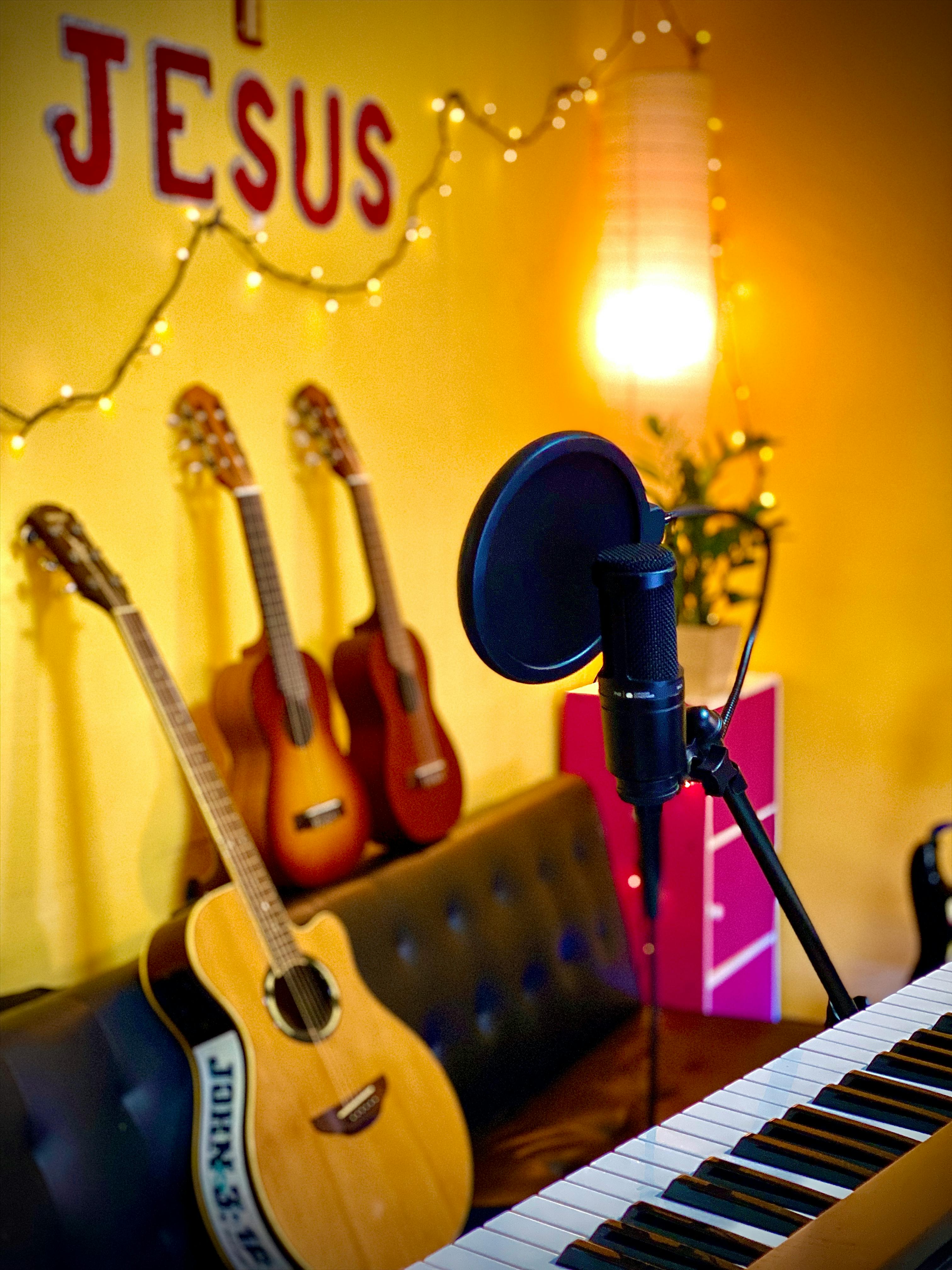 Musical Instruments and Microphone in Religious Venue · Free Stock Photo